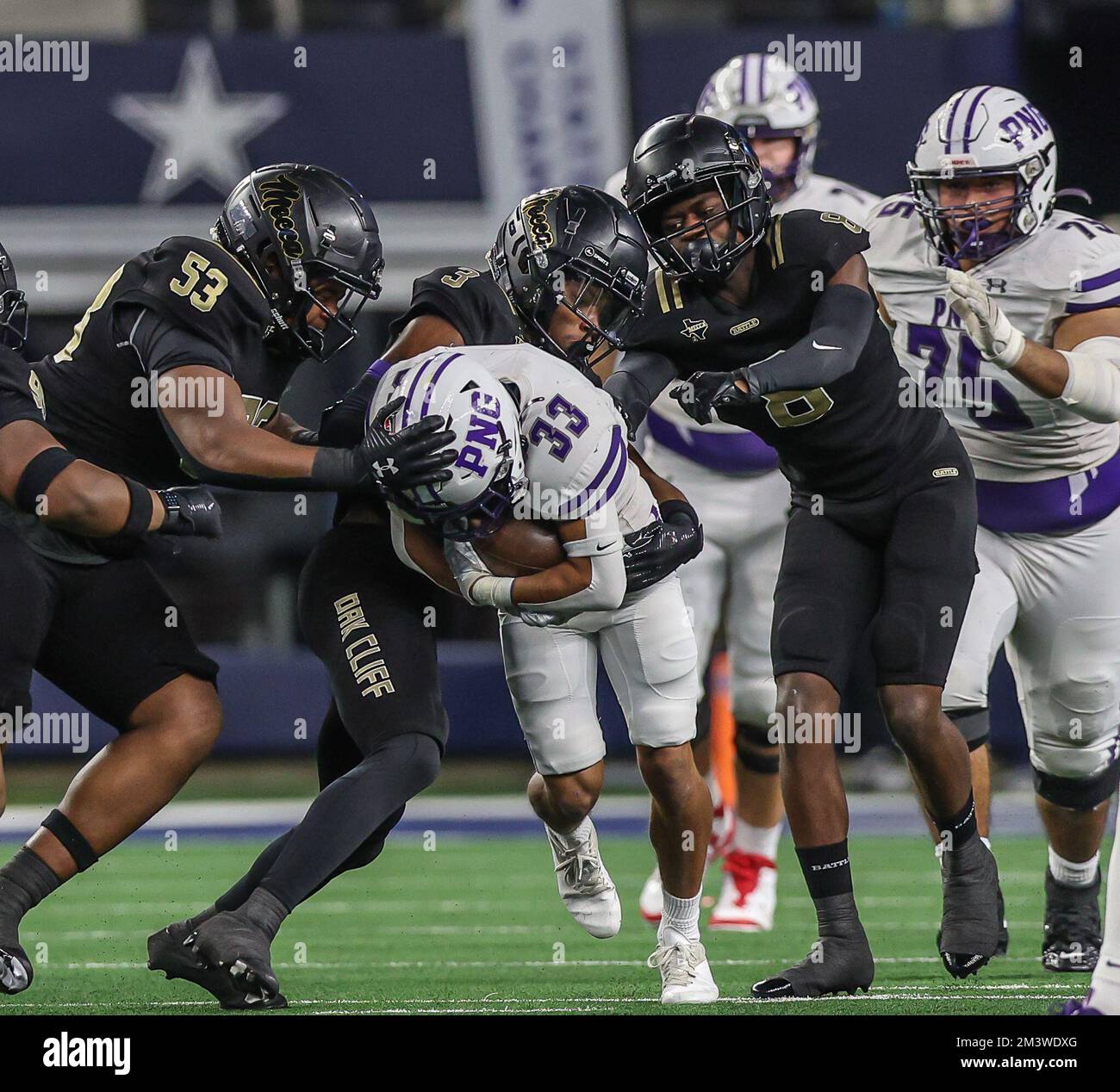Dallas, TX, USA. 16th Dec, 2022. A group of South Oak Cliff defenders ...
