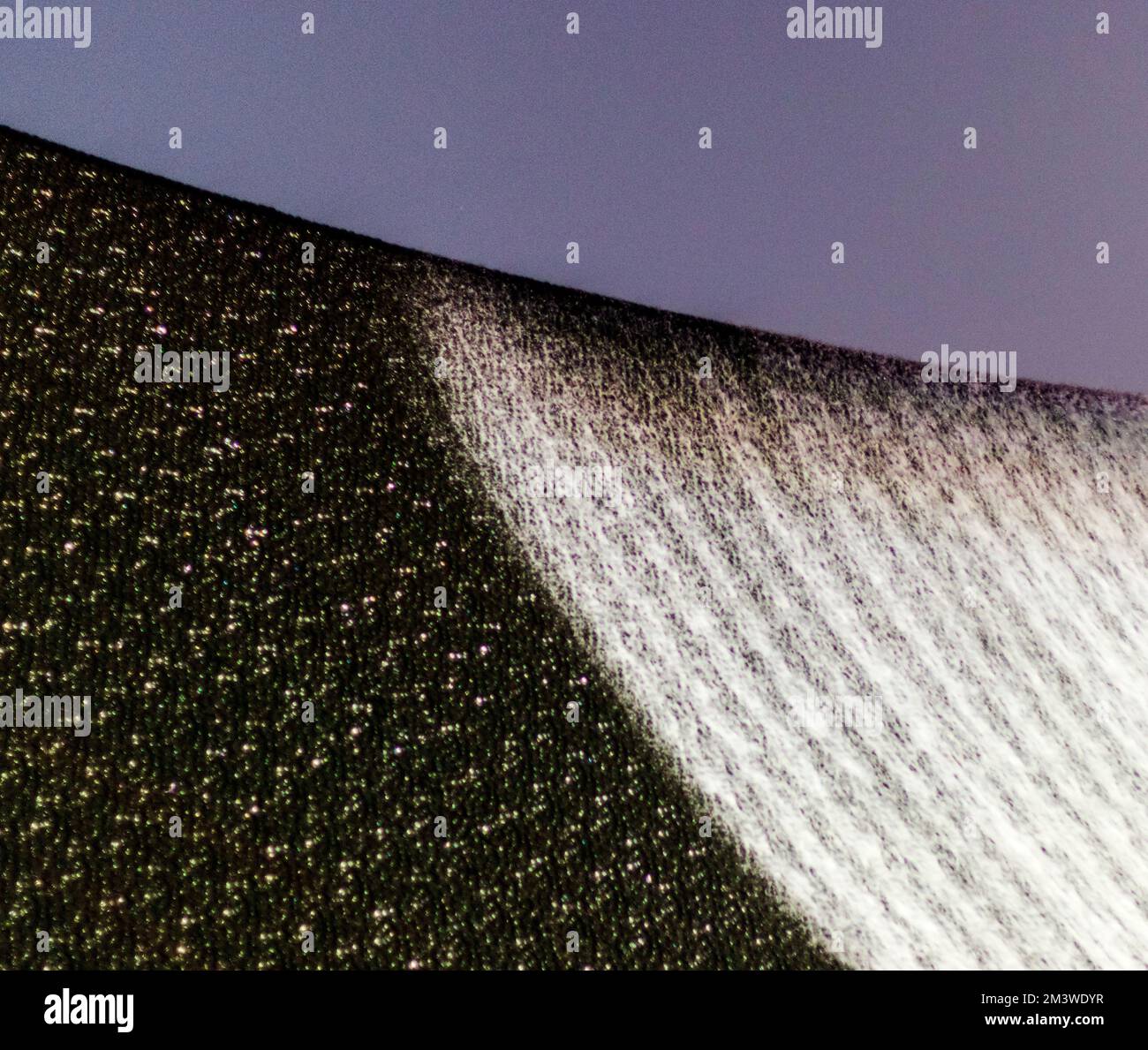 Shot of a artificial waterfall installation Stock Photo - Alamy