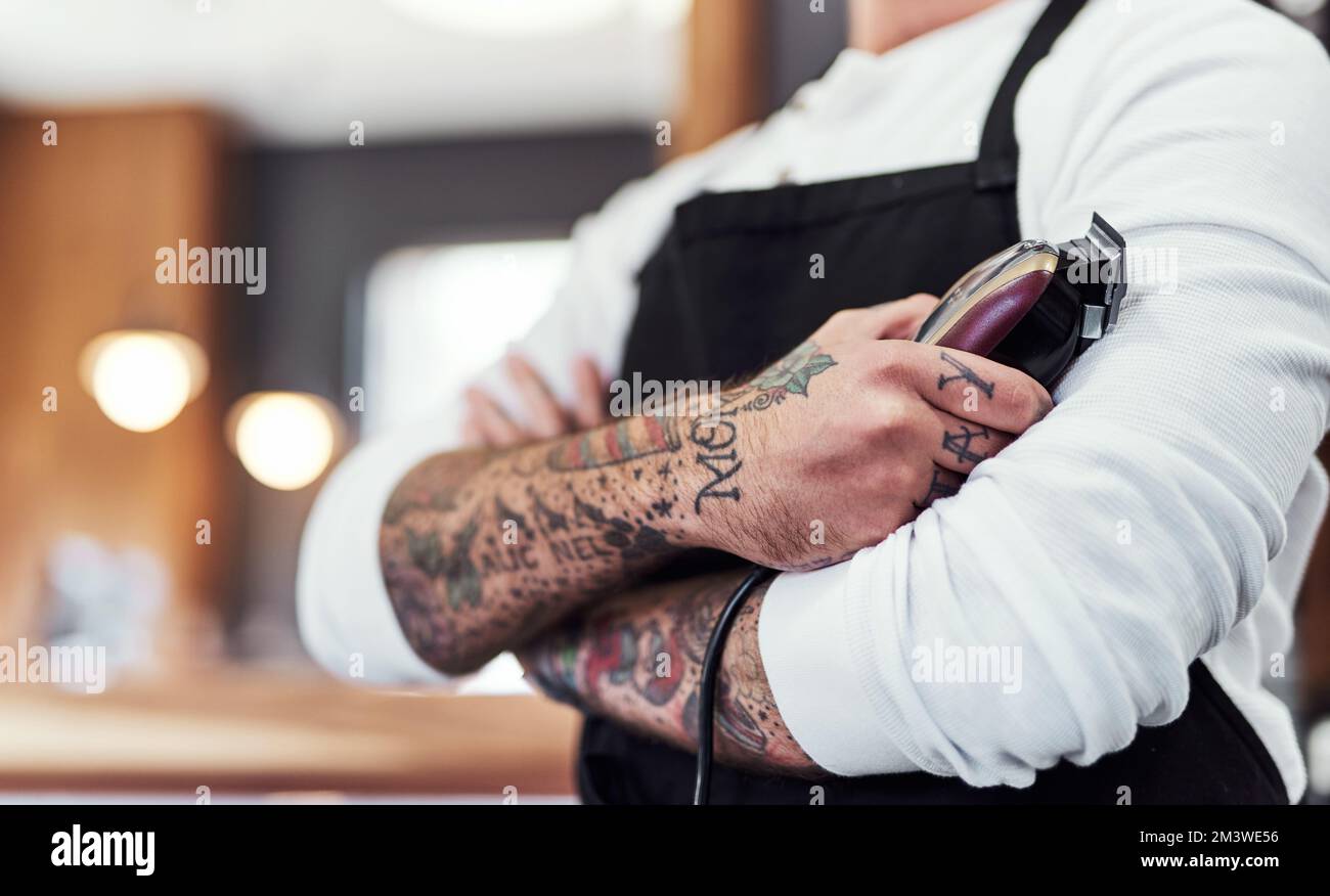 Ill make you look hip and trendy in no time. an unrecognizable tattooed ...