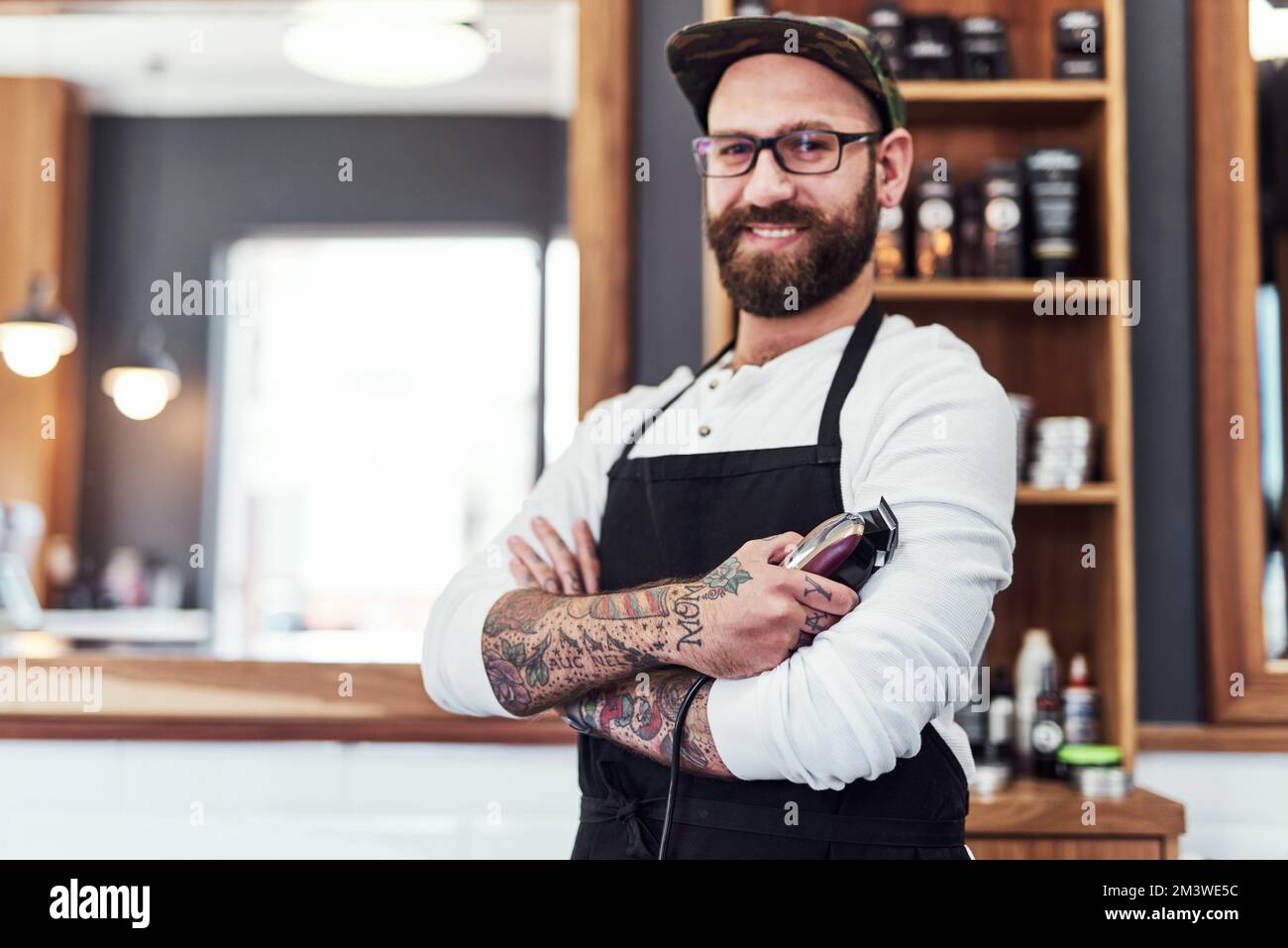 Stop by for the hippest haircuts in the city. Portrait of a handsome ...