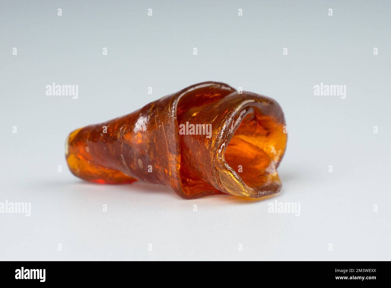 a piece fragrant amber terpy live resin for smoking cannabis, shatter ...