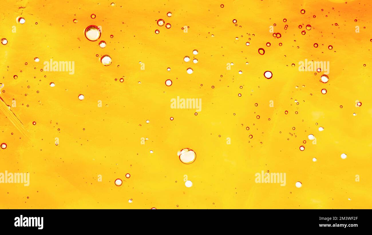 texture yellow golden cannabis wax, marijuana shatter resin concentrate ...