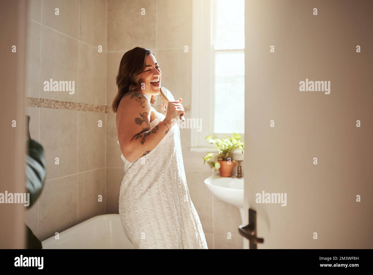 Lets get ready to rock this day. an attractive young woman singing ...