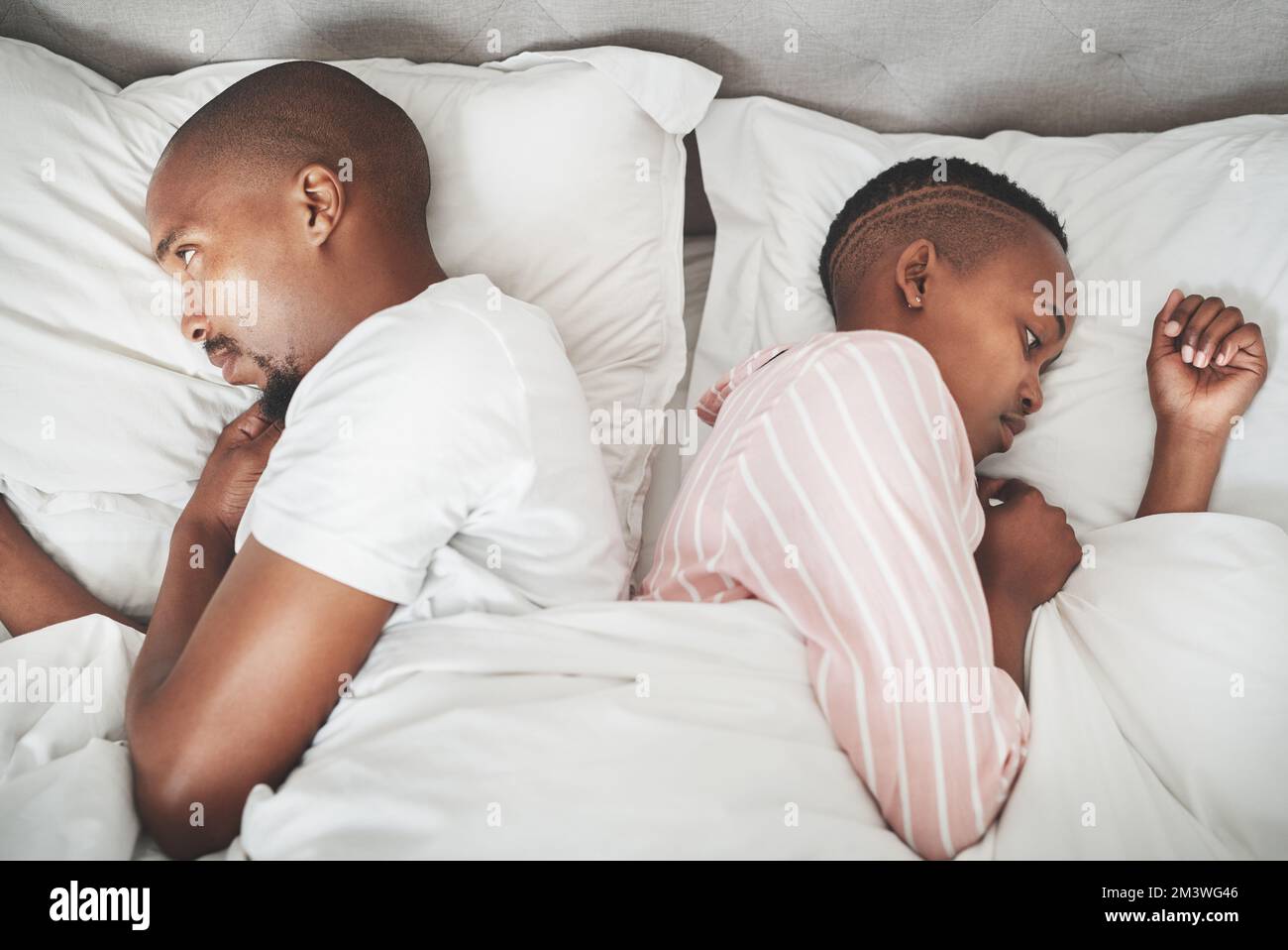 When youve both just stopped trying. a young couple ignoring each other ...
