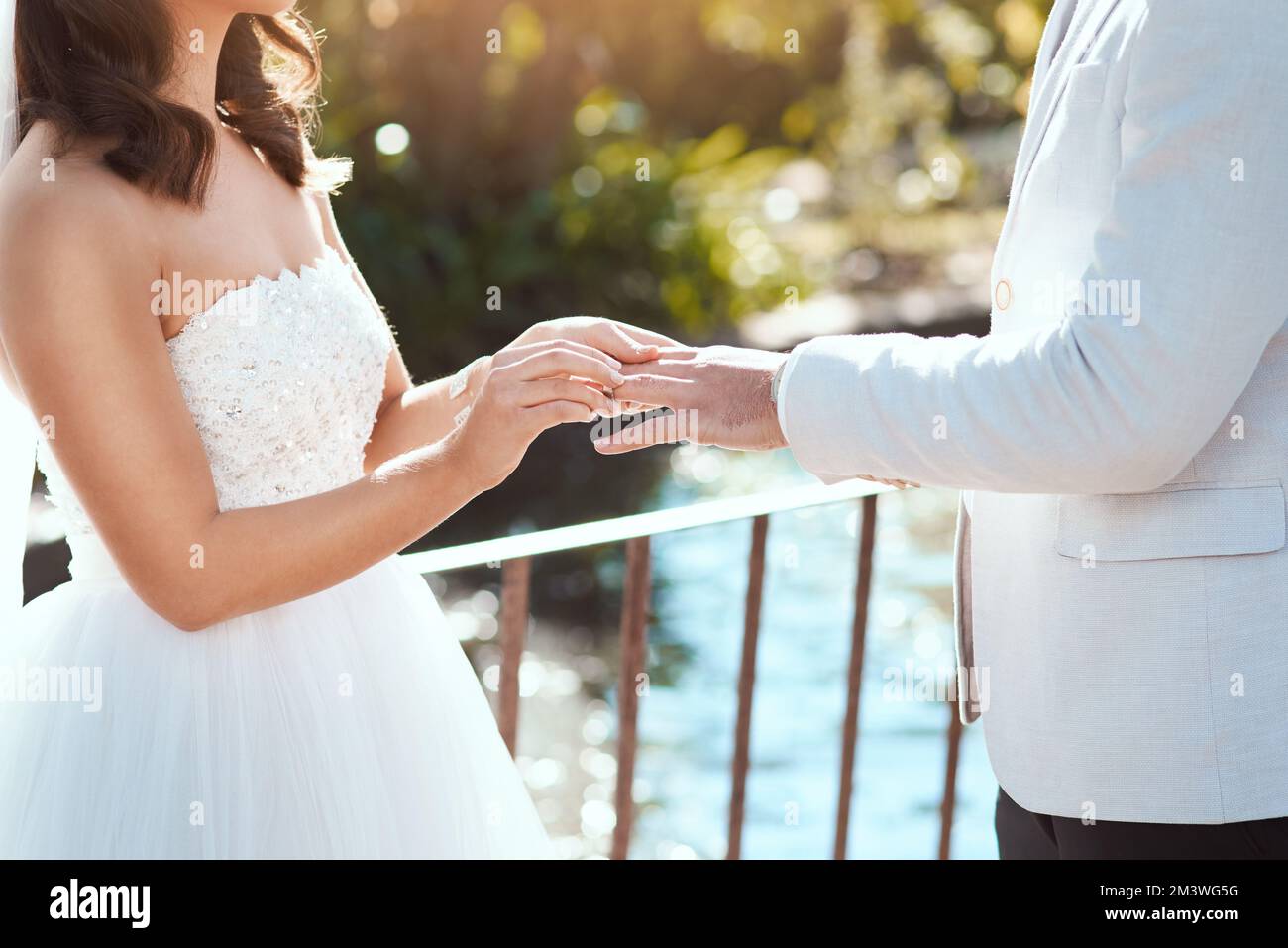 I promise to love and to cherish you. an unrecognizable bride slipping ...