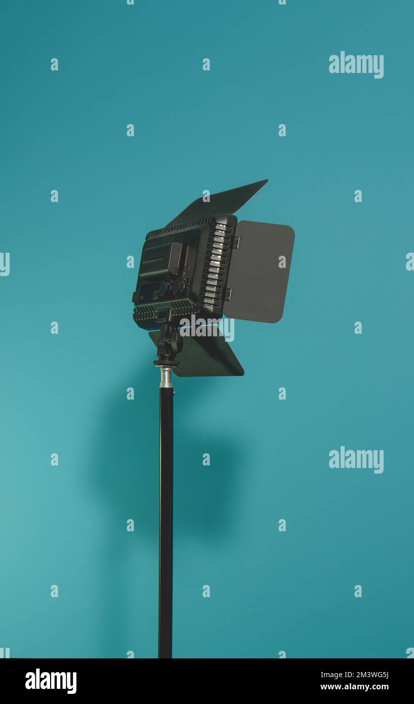 lighting device for video and photo shooting. On a blue background ...