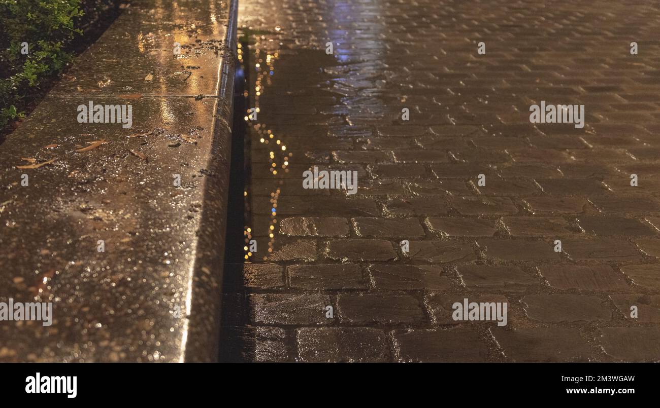 Texture of wet sidewalk after rain with illumination reflection Stock ...