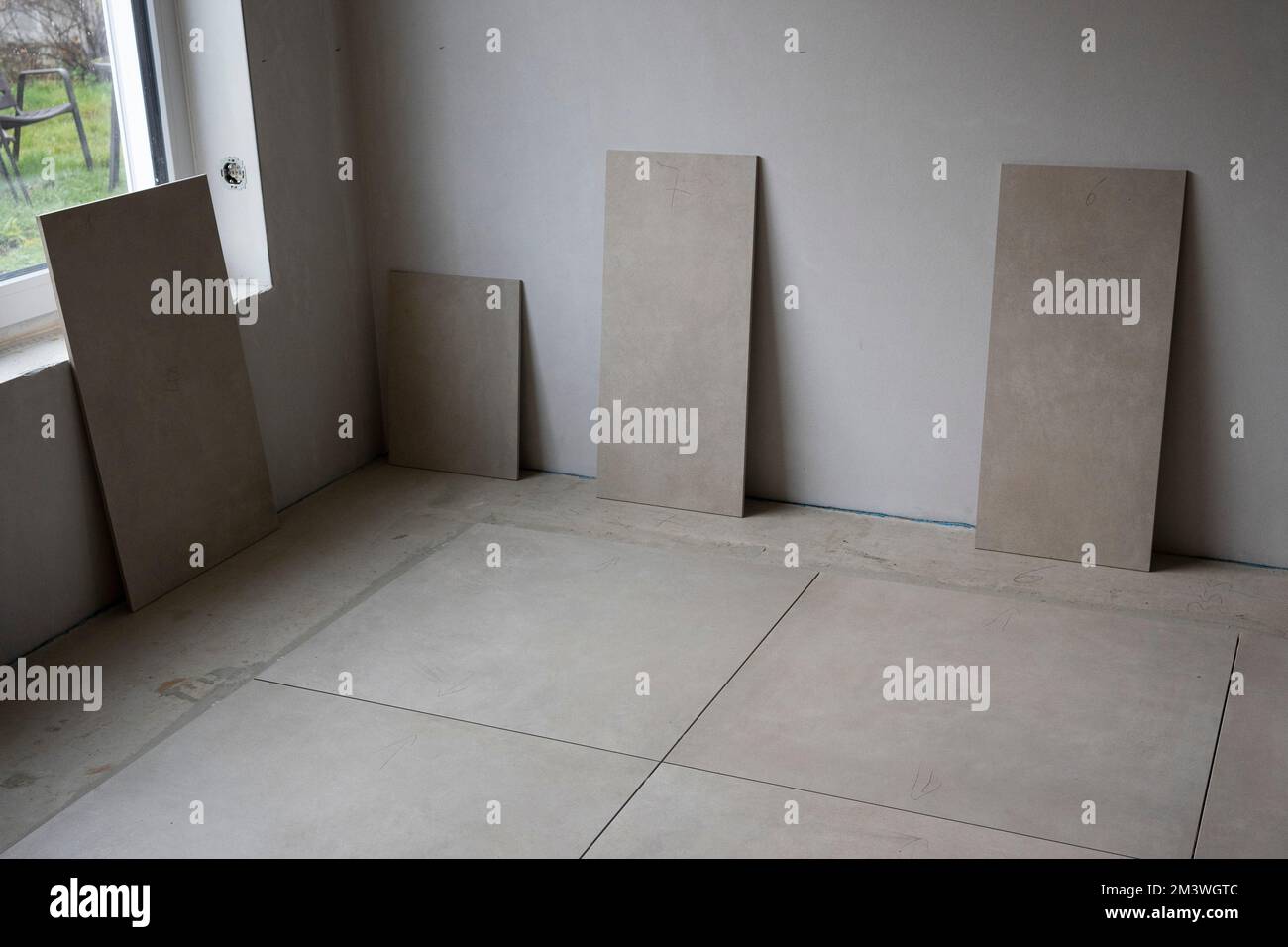 A view of the room's interior tile installation process - house ...