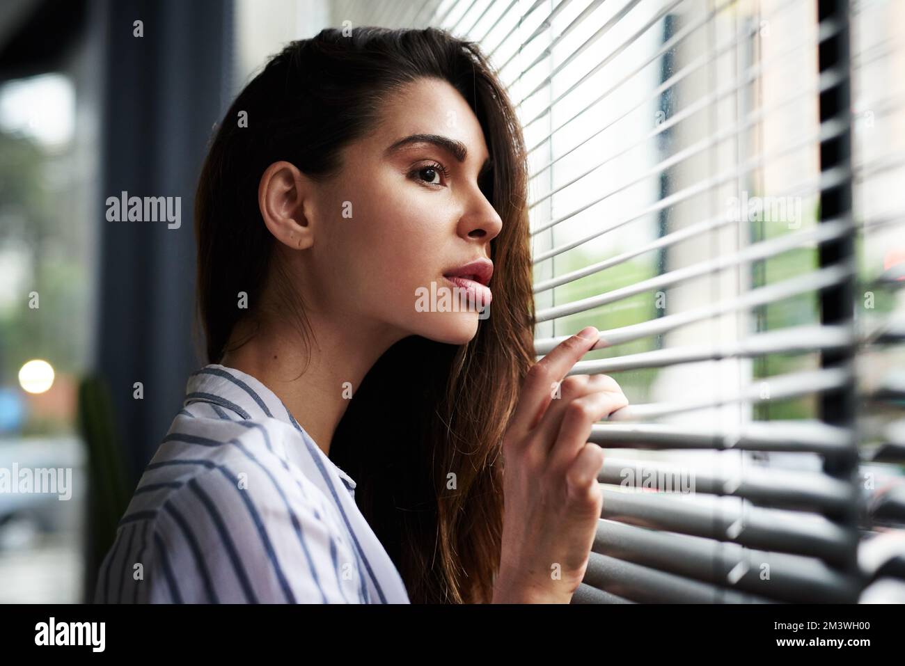 Think I should be outdoors today. an attractive young woman looking ...