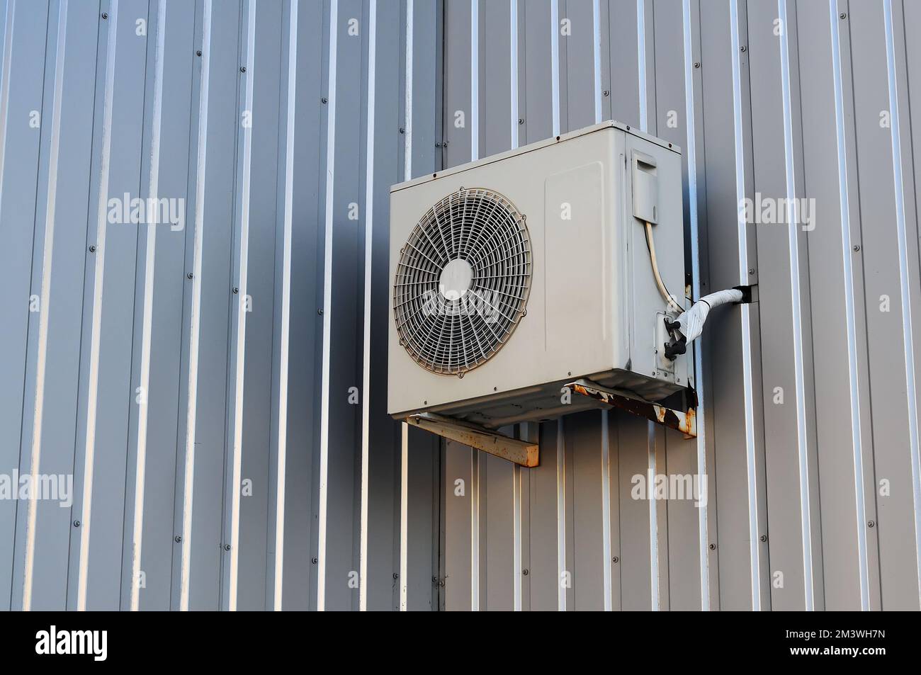 The external unit of the air conditioner is installed on the facade of ...