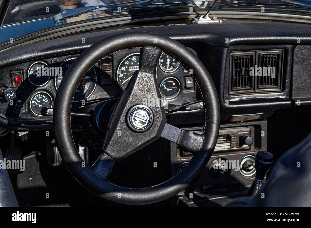 An interior view of a vintage MGB two-door sports car from the 1960s ...