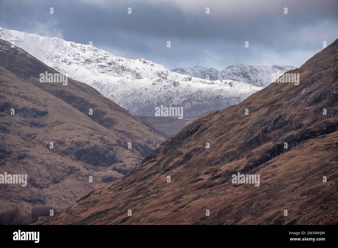 Epic Winter landscape image of snowcapped Three Sisters mountain range ...