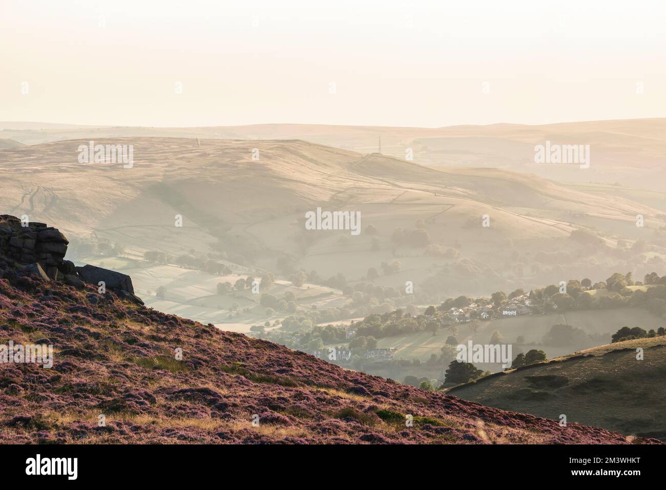 Beautiful late Summer landscape image looking through heather into ...