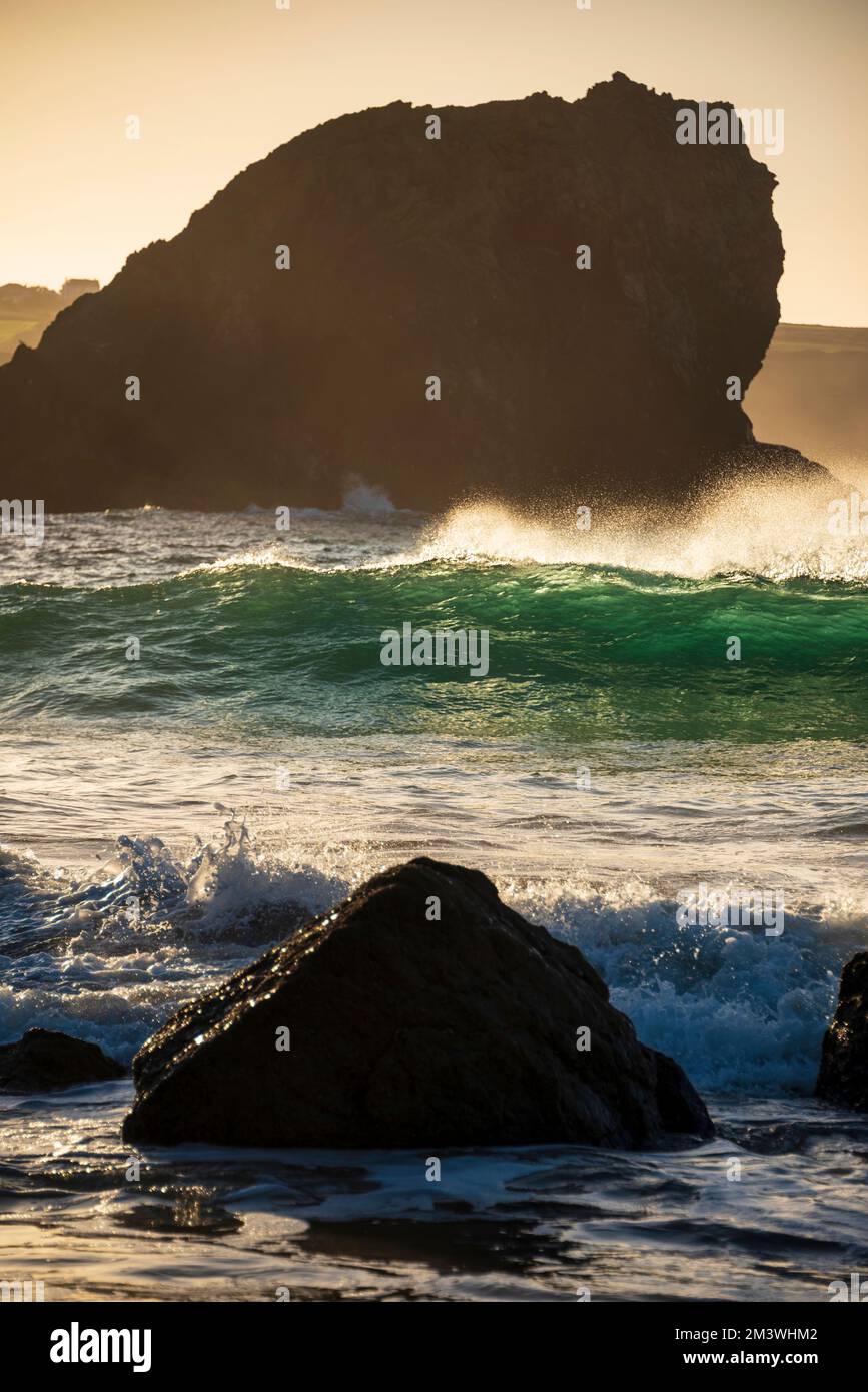 Epic landscape image of jade turquoise waves crashing onto shore and ...