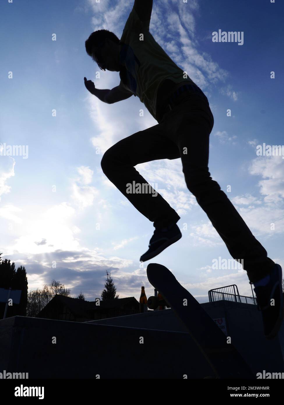 silhouette skateboarder shadow tricks outside Stock Photo - Alamy