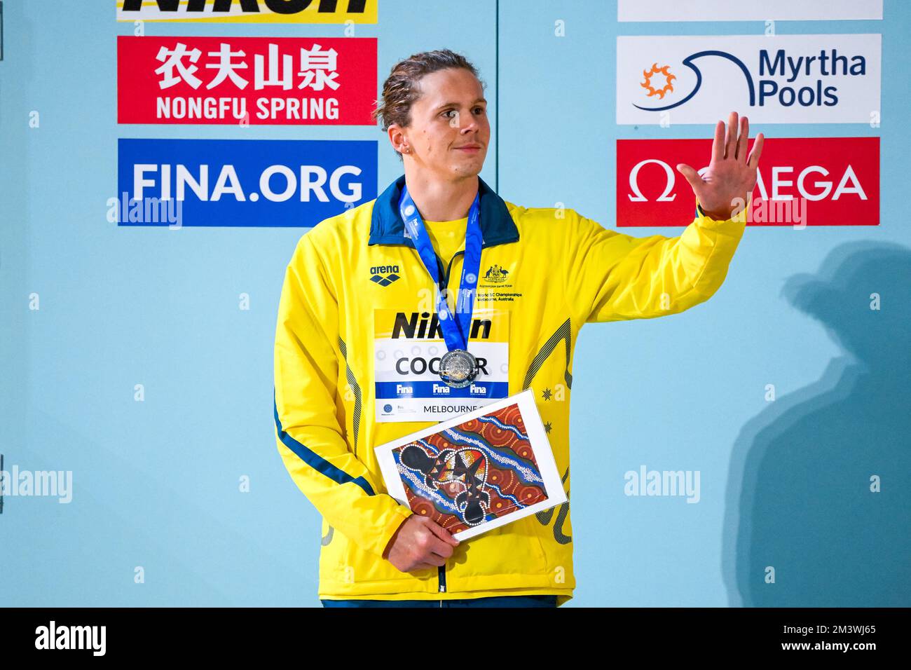 Isaac Cooper of Australia stands with the silver medal after compete in ...