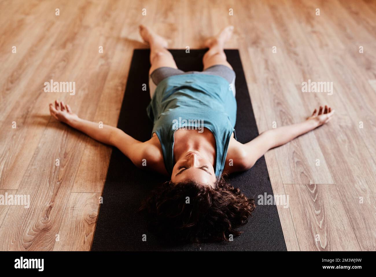 When the worlds been lifted off your shoulders. a young woman resting ...