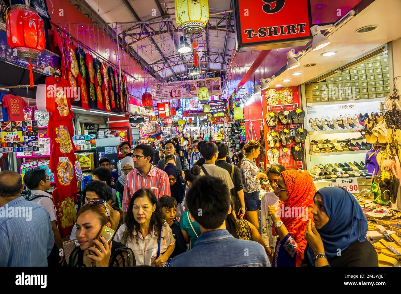 Bugis Street market is a popular tourist destination, and is close to ...