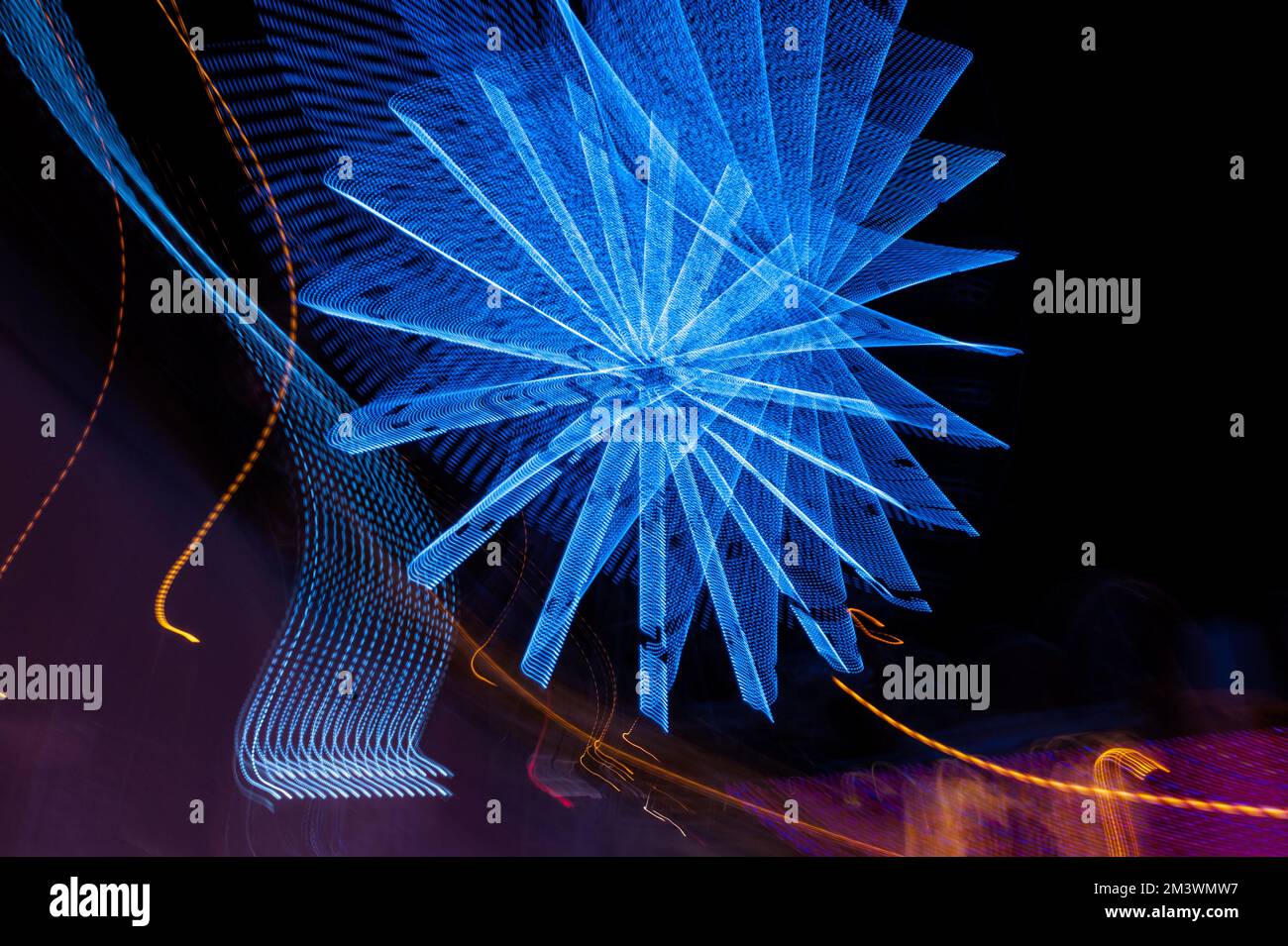 Ferris wheel. Rotating illuminated attraction in amusement park at ...