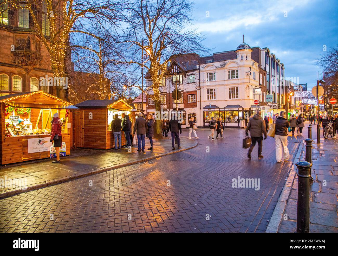 People shopping at the Christmas street market in the Cheshire city of ...