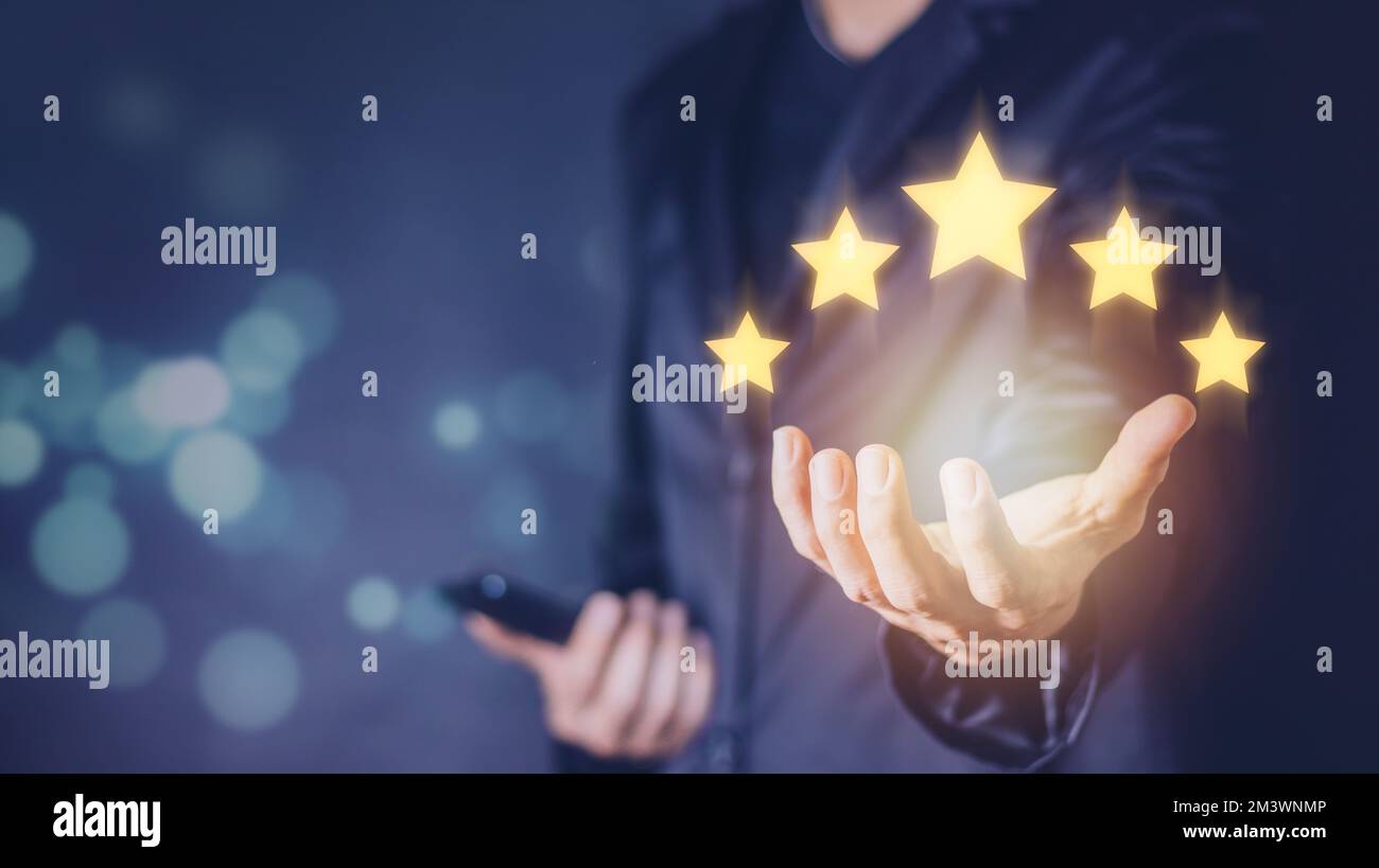 Hand shows the sign of the top service Quality assurance 5 star ...