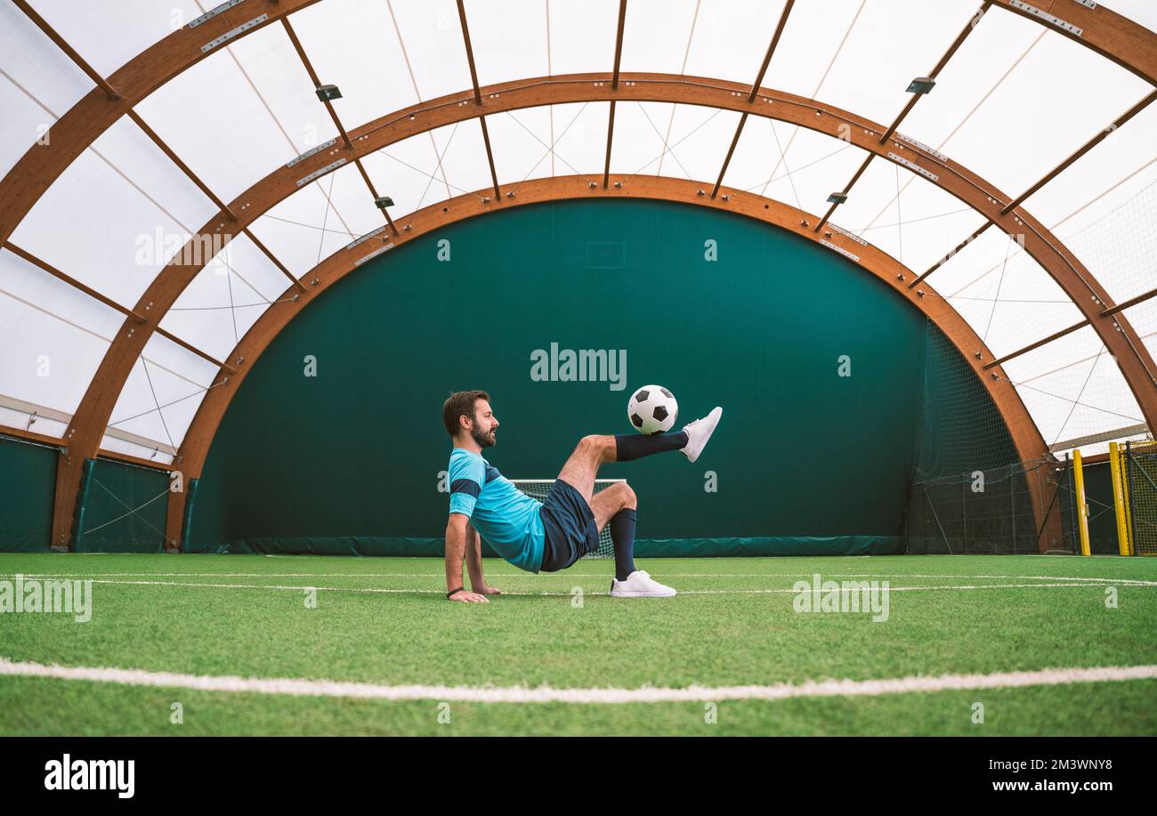 Cinematic image of a soccer freestyle player making tricks with the ...