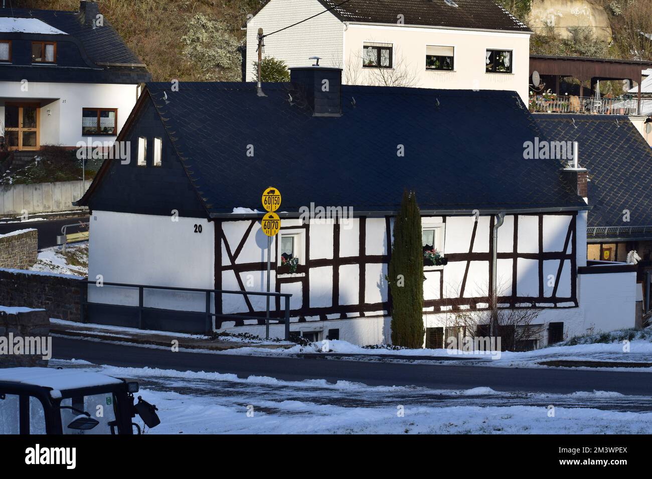 half-timbered house on the inside of a curve Stock Photo - Alamy