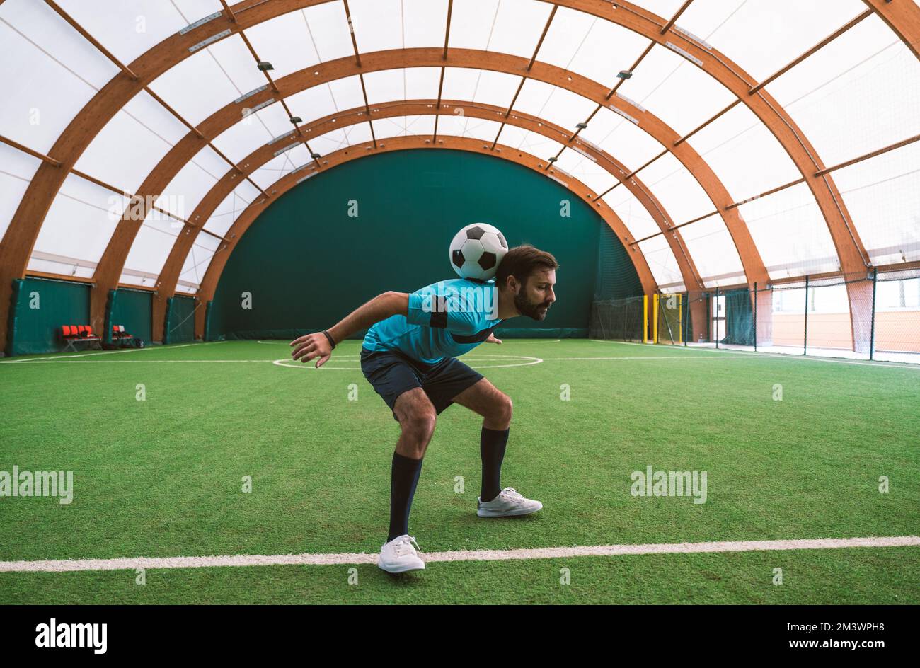 Cinematic image of a soccer freestyle player making tricks with the ...