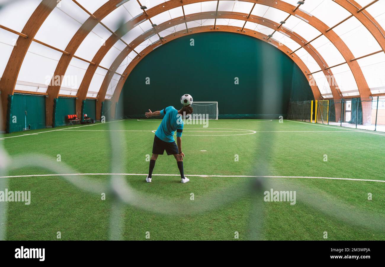 Cinematic image of a soccer freestyle player making tricks with the ...