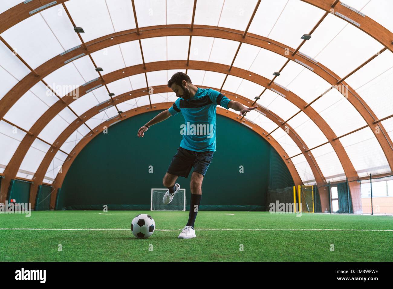 Cinematic image of a soccer freestyle player making tricks with the ...