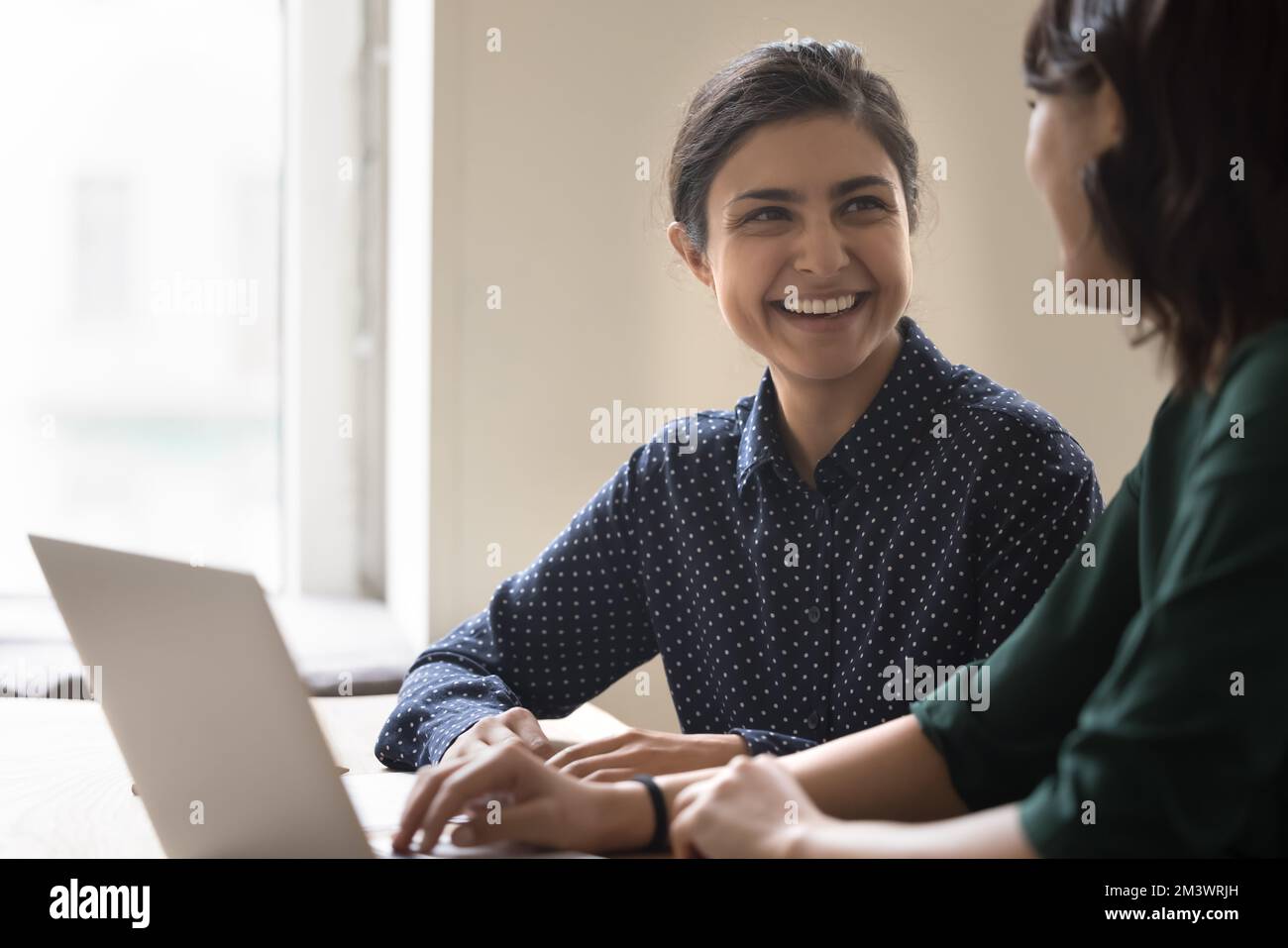 Diverse female business woman talking hi-res stock photography and images - Alamy