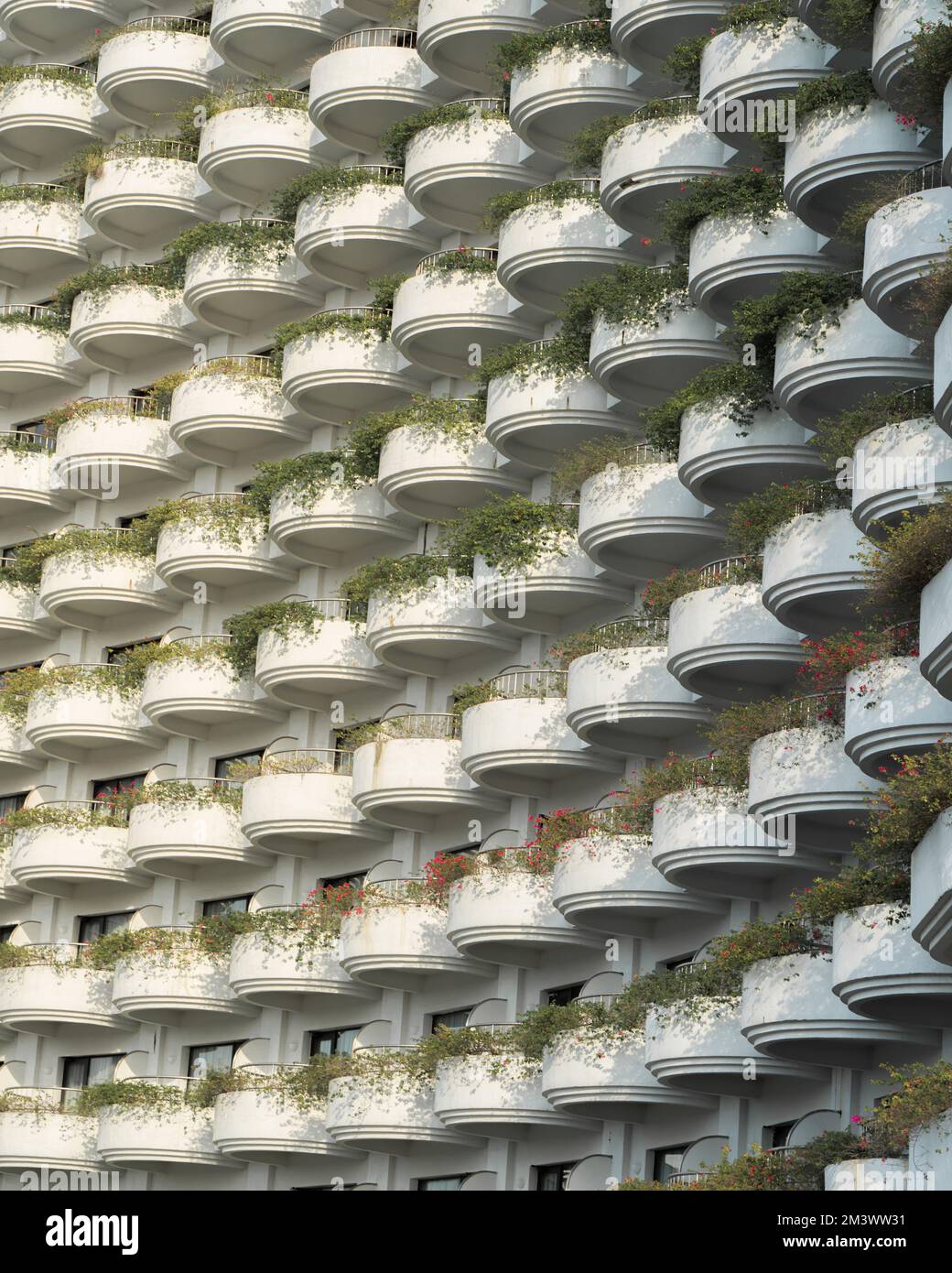 A beautiful exterior view of circular balconies architecture of a hotel ...