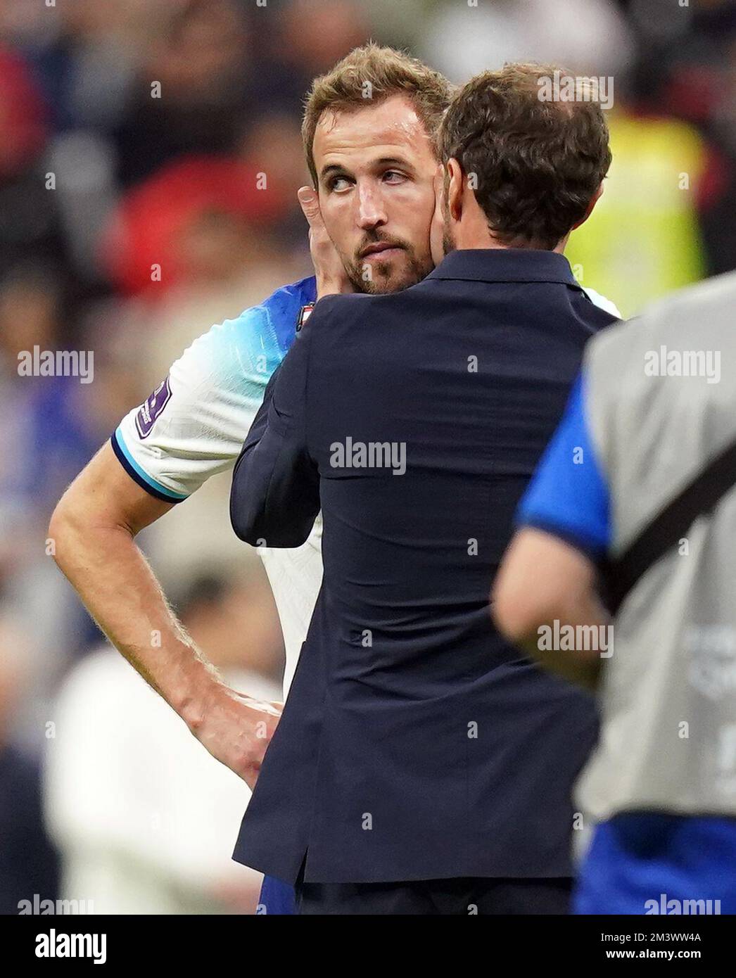 File photo dated 10-12-2022 of England's Harry Kane is consoled by ...