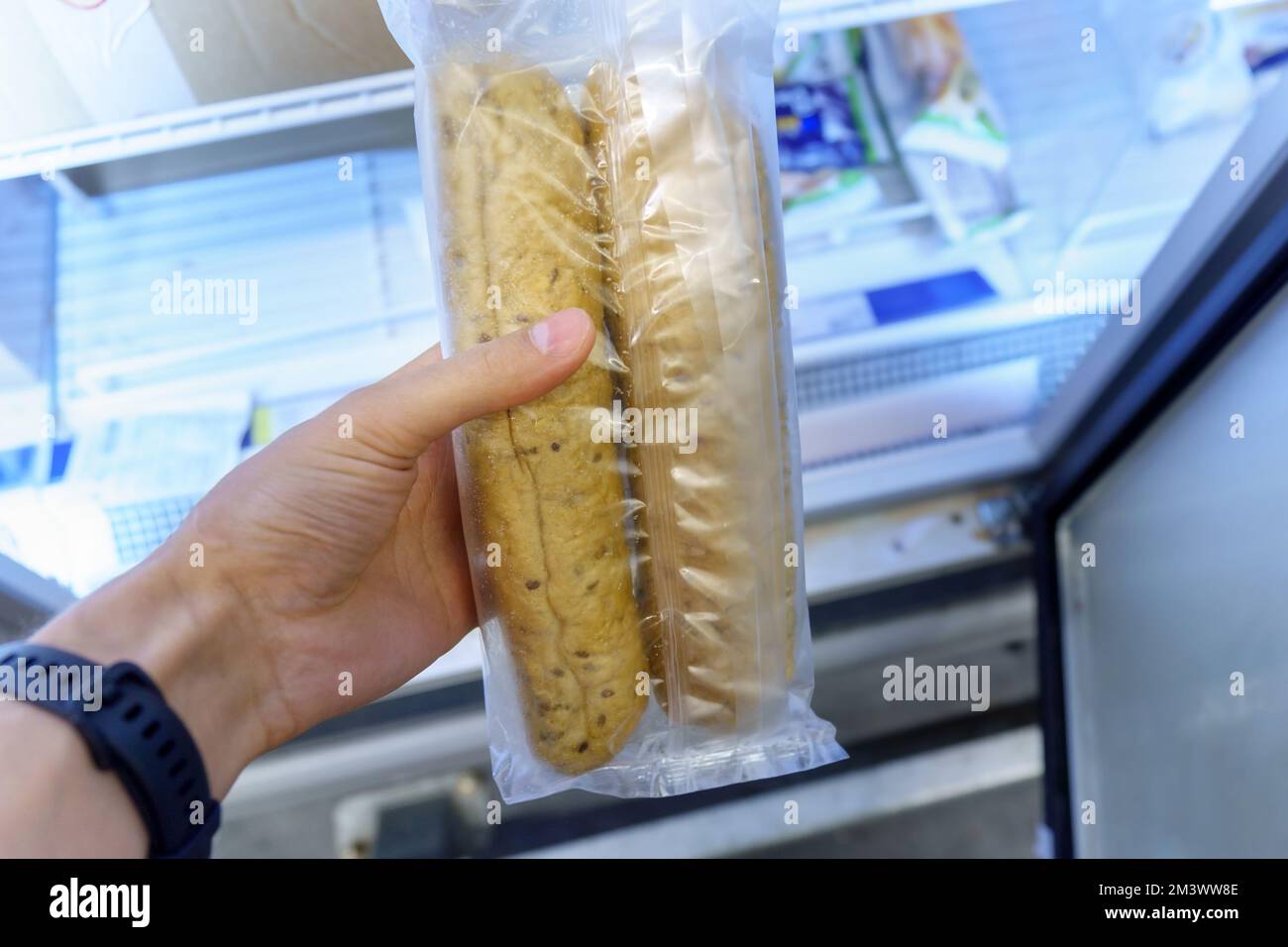 Frozen food on a shelf of a home freezer, long life food storage ...