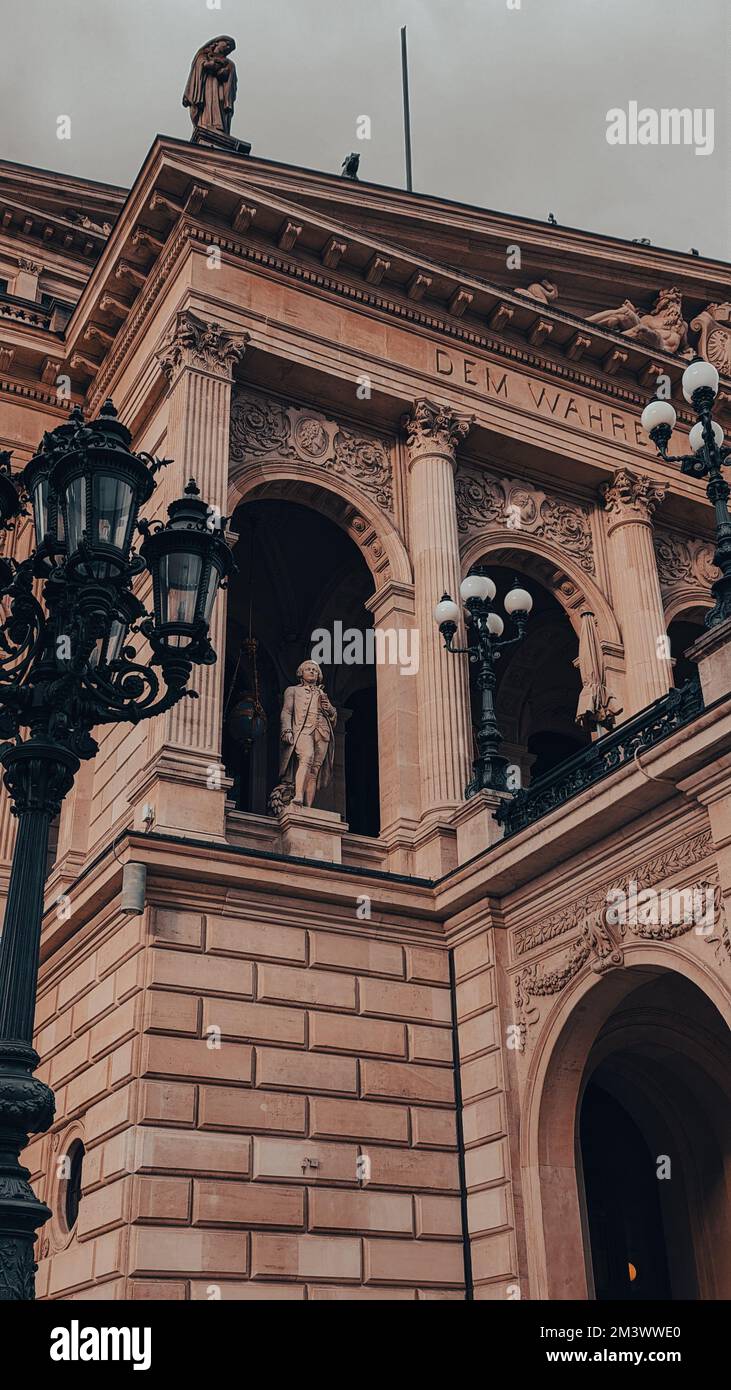 A vertical closeup of the Alte Oper concert hall in Frankfurt, Germany ...