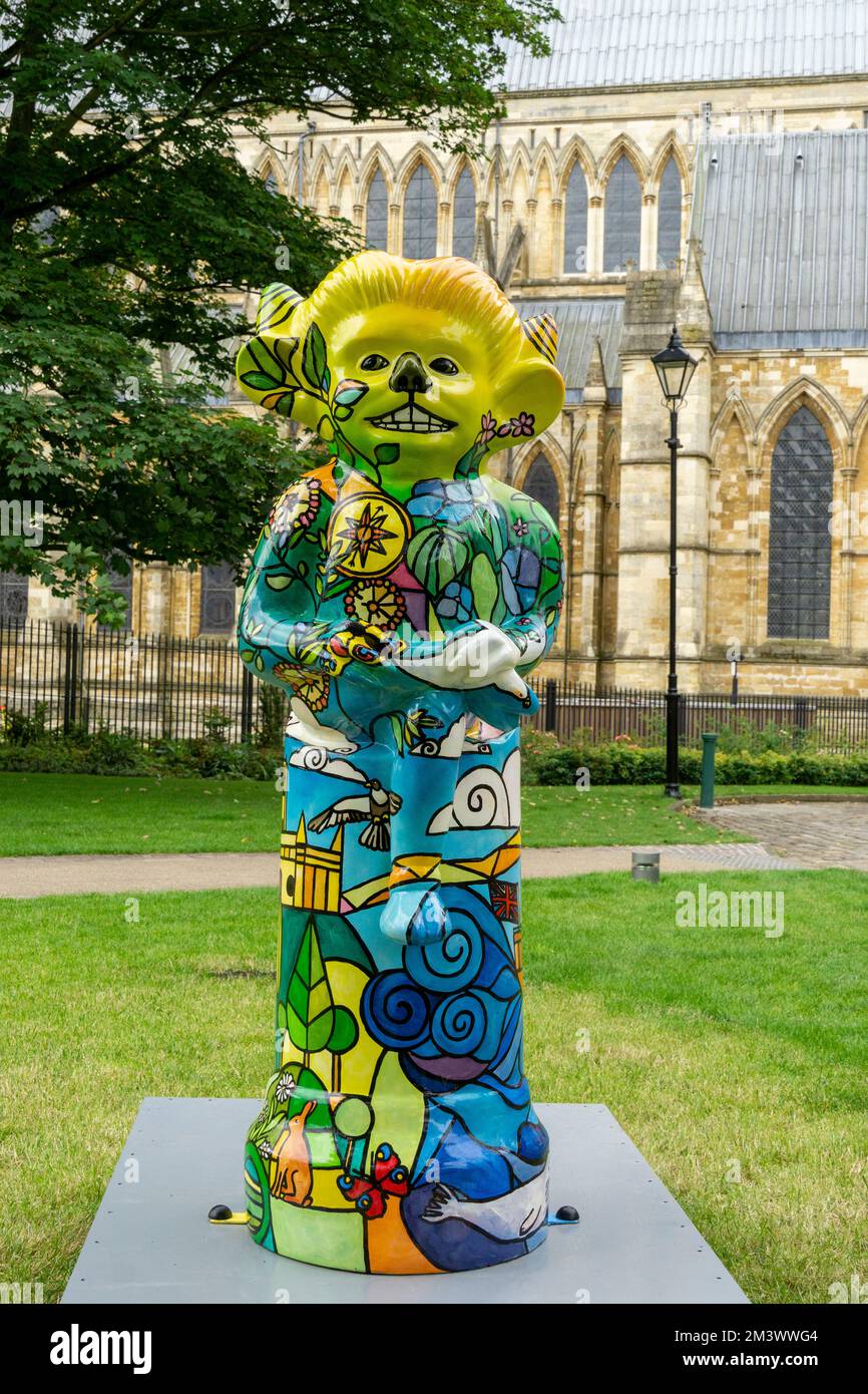 Decorated statue in style of stained glass windows hi-res stock ...
