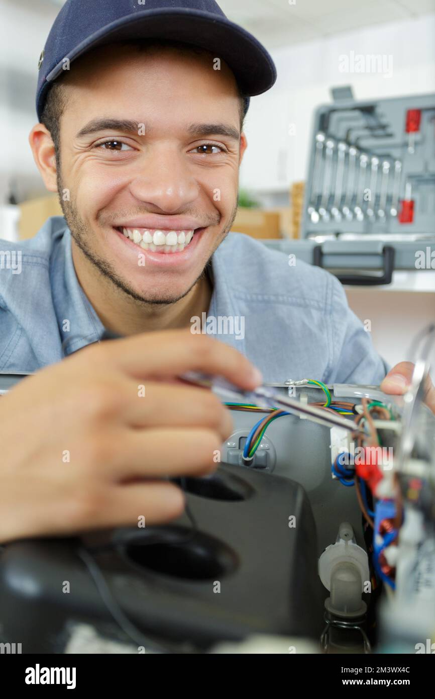 Technician installing network cables hi-res stock photography and ...