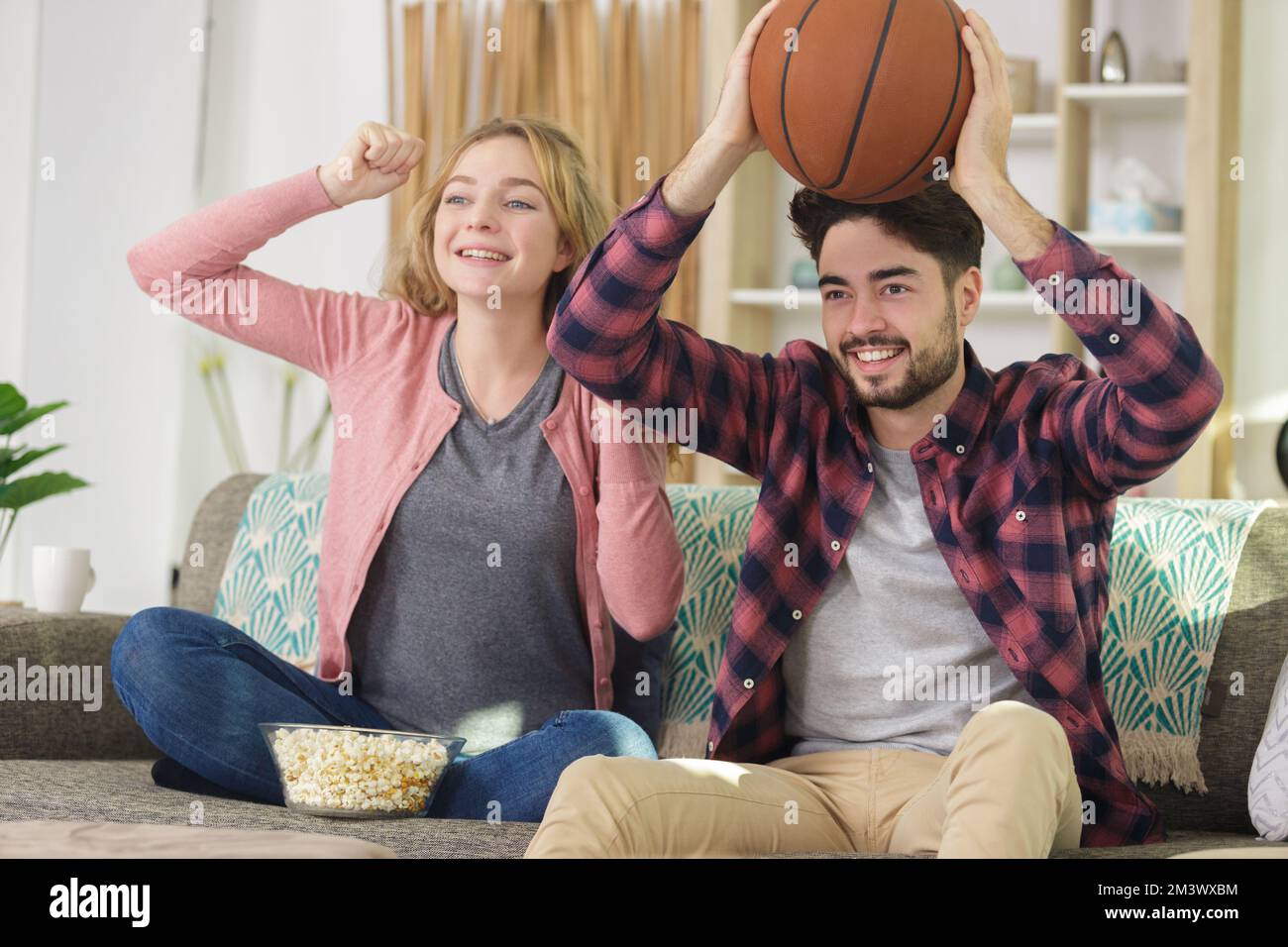 Couple football sports fans watching hi-res stock photography and ...