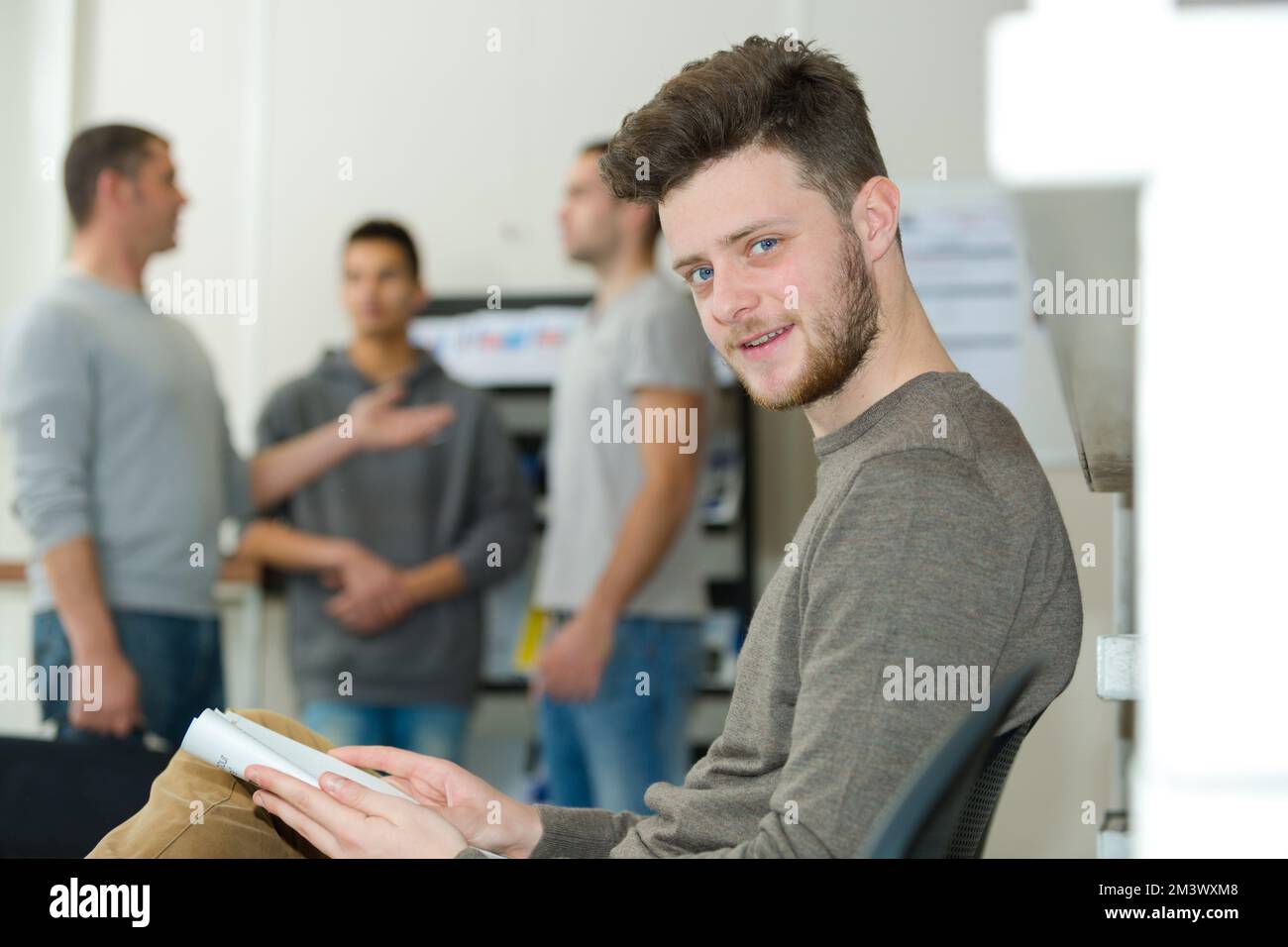 portrait of teenage male student in a waiting room Stock Photo - Alamy