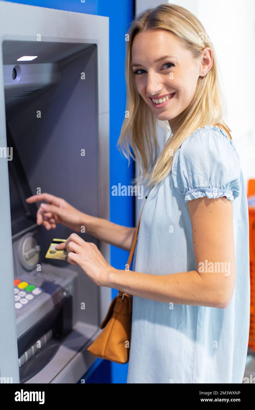 Young person uses credit card hi-res stock photography and images - Alamy
