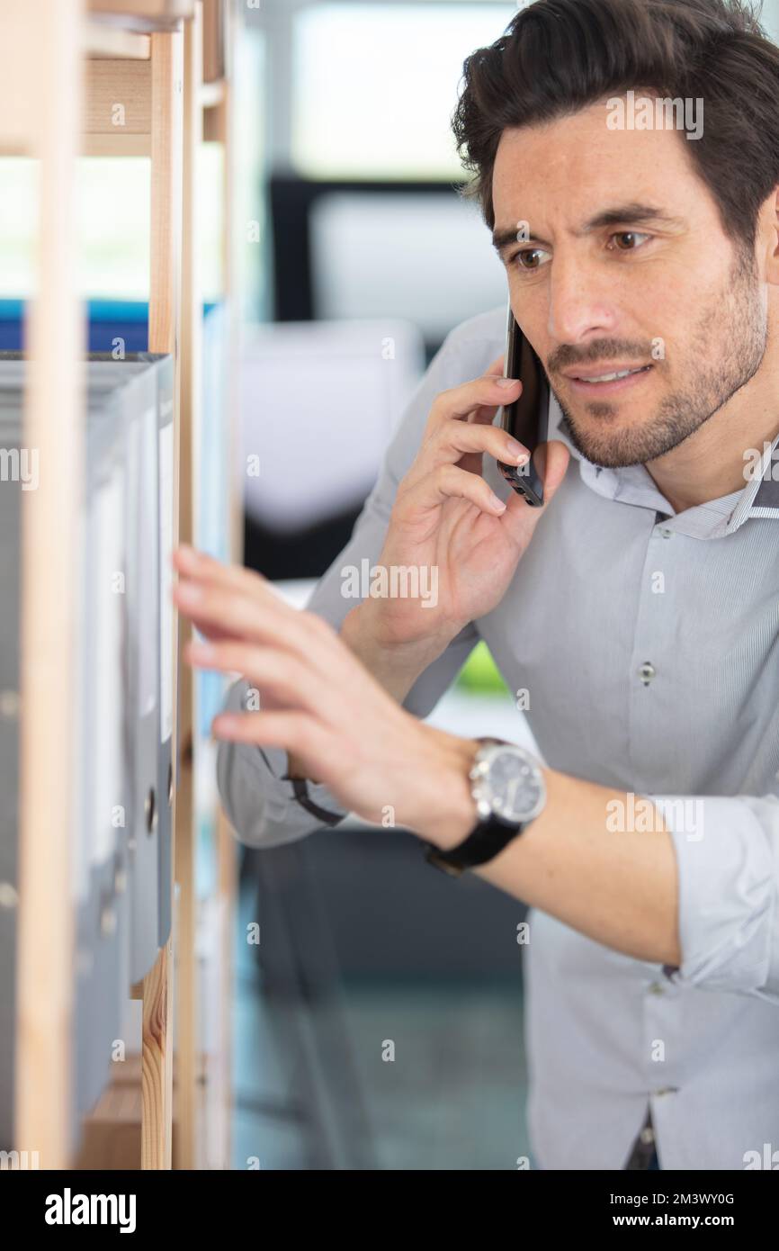 Catalog checking hi-res stock photography and images - Alamy