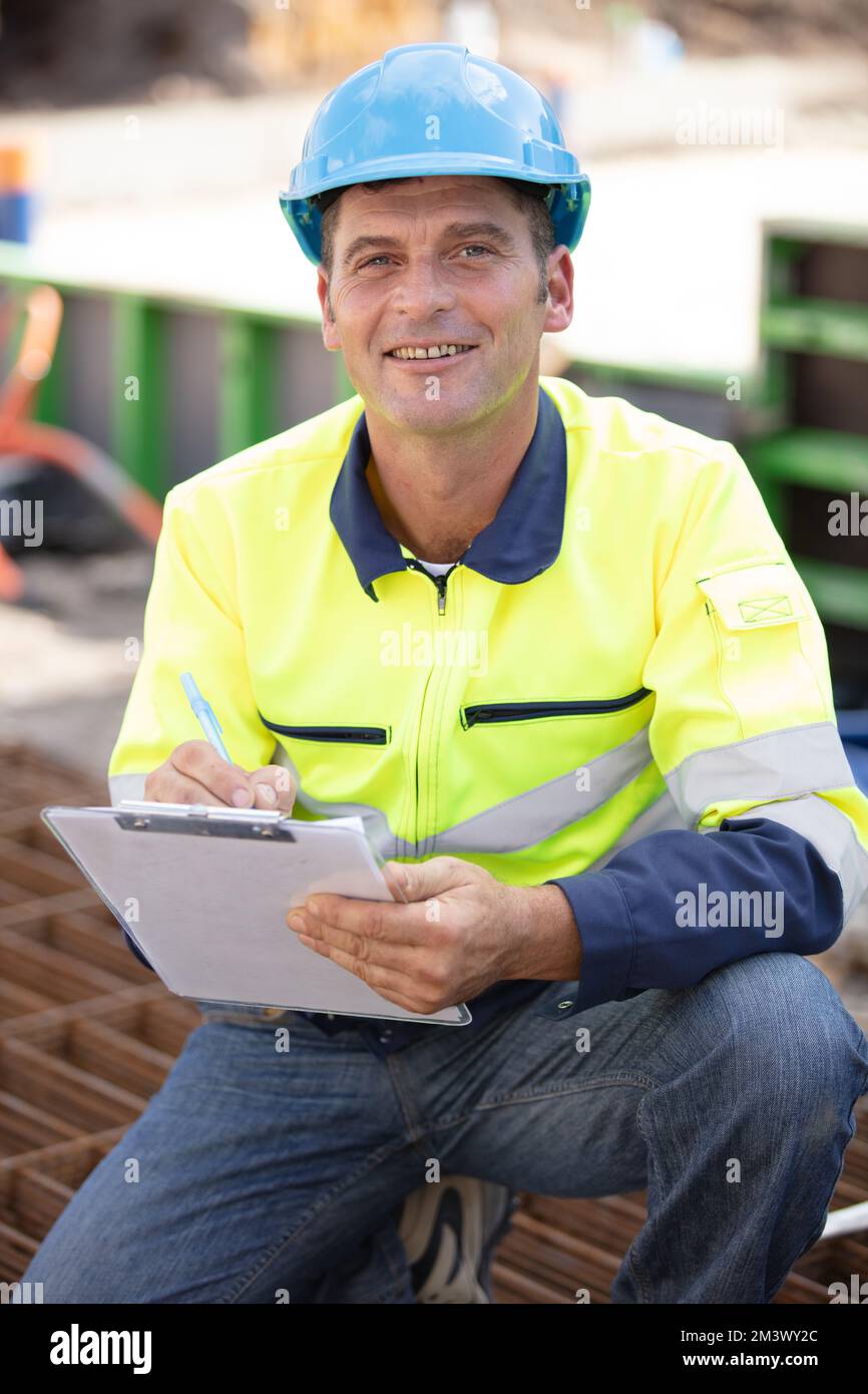 business building paperwork and people concept Stock Photo - Alamy