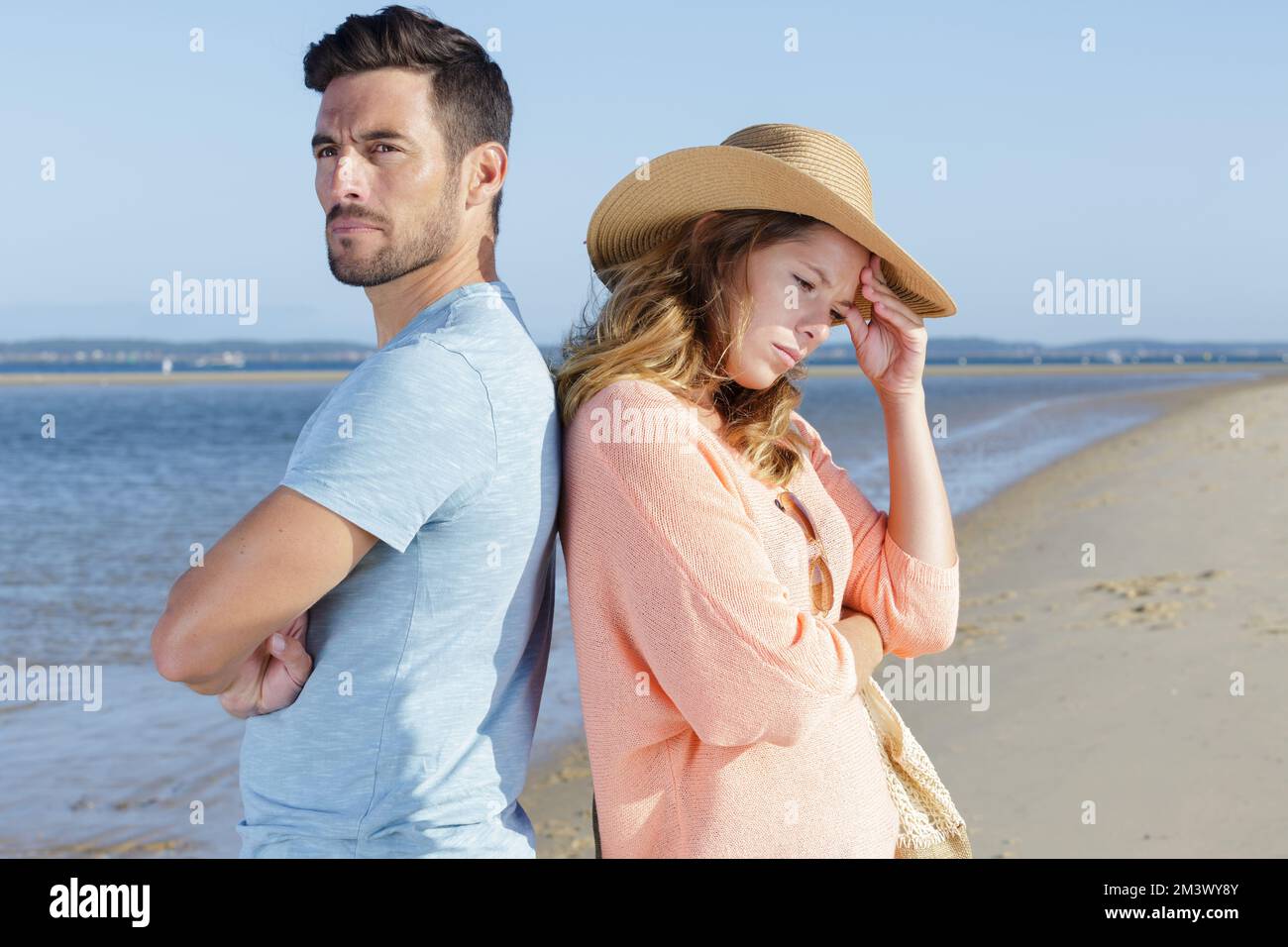 angry couple turning their back on each other Stock Photo - Alamy