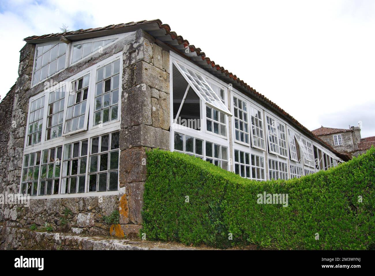 A Beautiful view of green historical garden Pazo de Oca with plants and ...