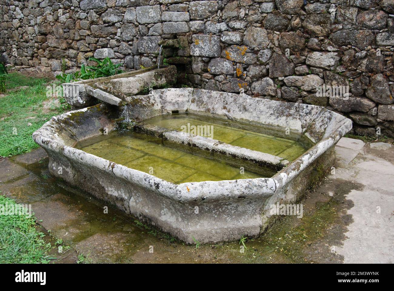 A Beautiful view of green historical garden Pazo de Oca with plants and ...