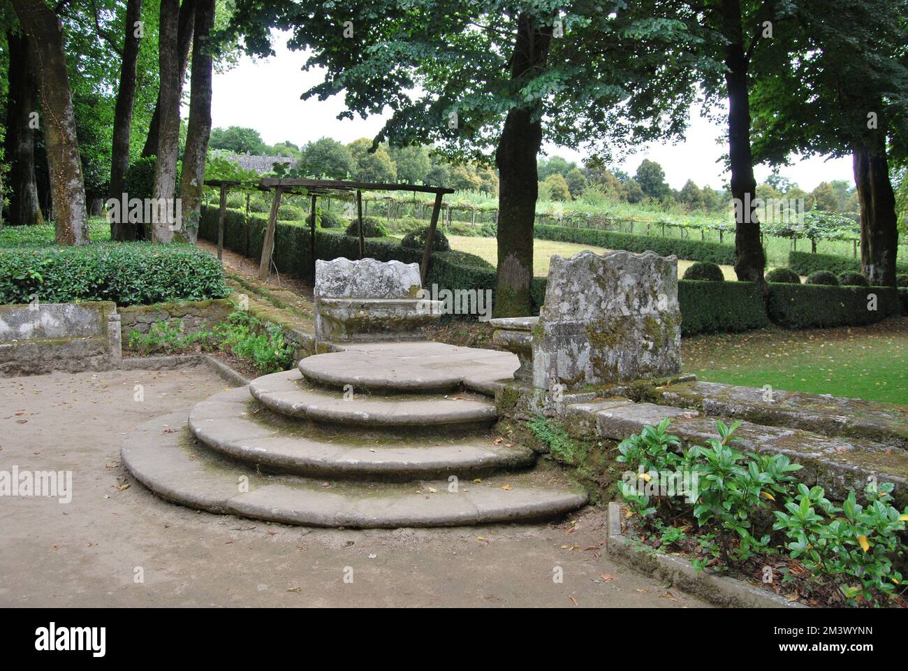 A Beautiful view of green historical garden Pazo de Oca with plants and ...