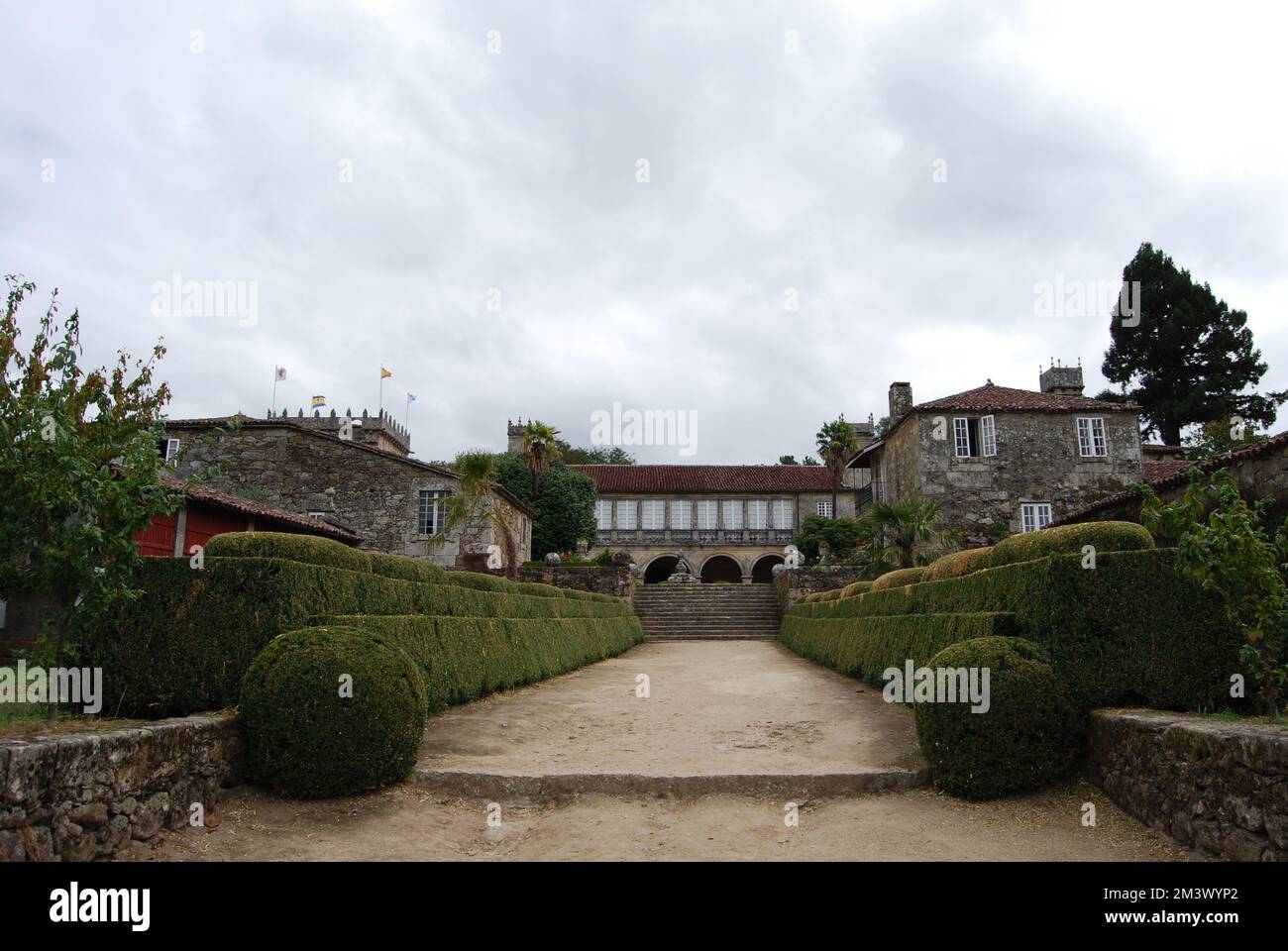 A Beautiful view of green historical garden Pazo de Oca with plants and ...
