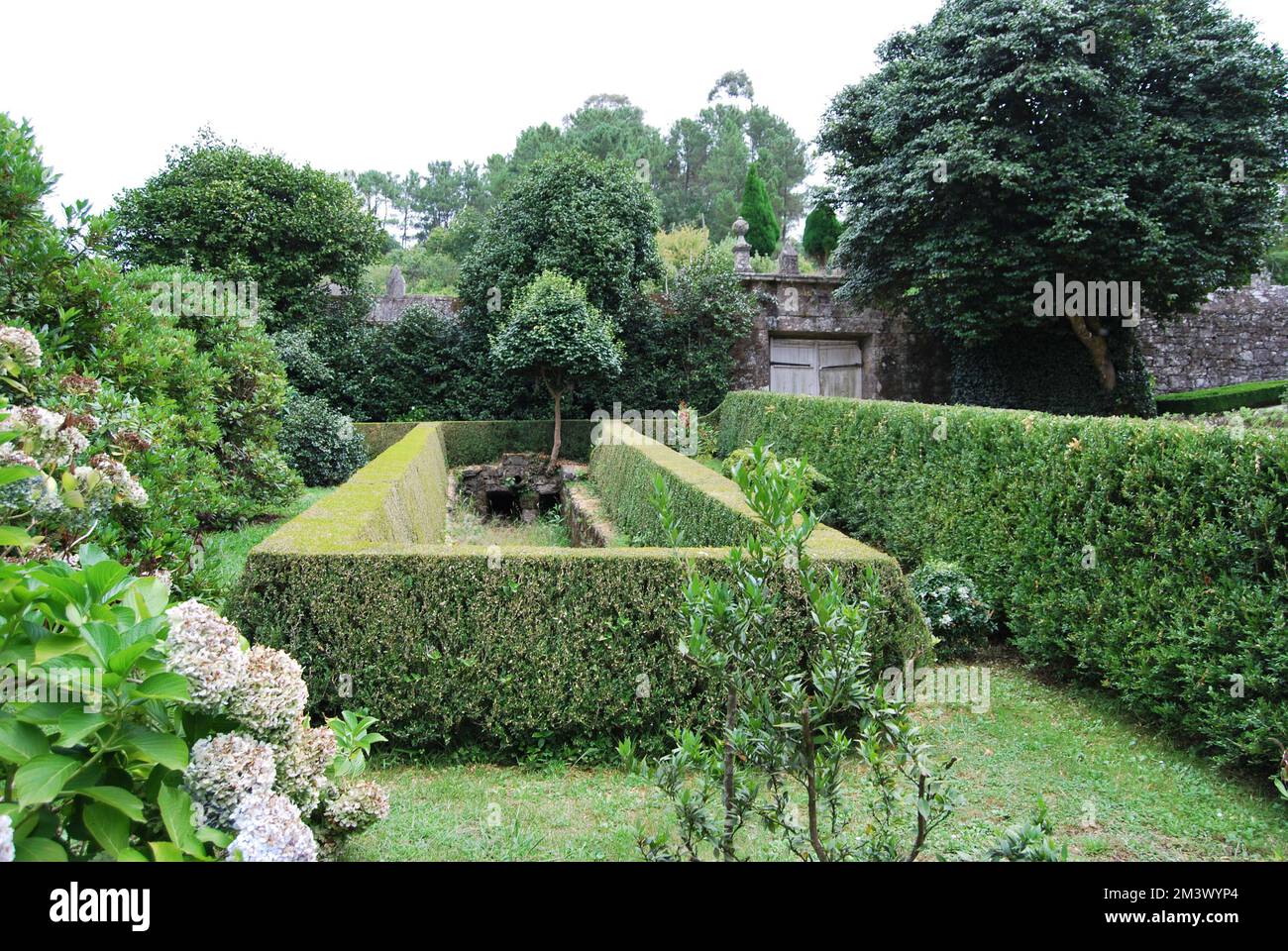 A Beautiful view of green historical garden Pazo de Oca with plants and ...