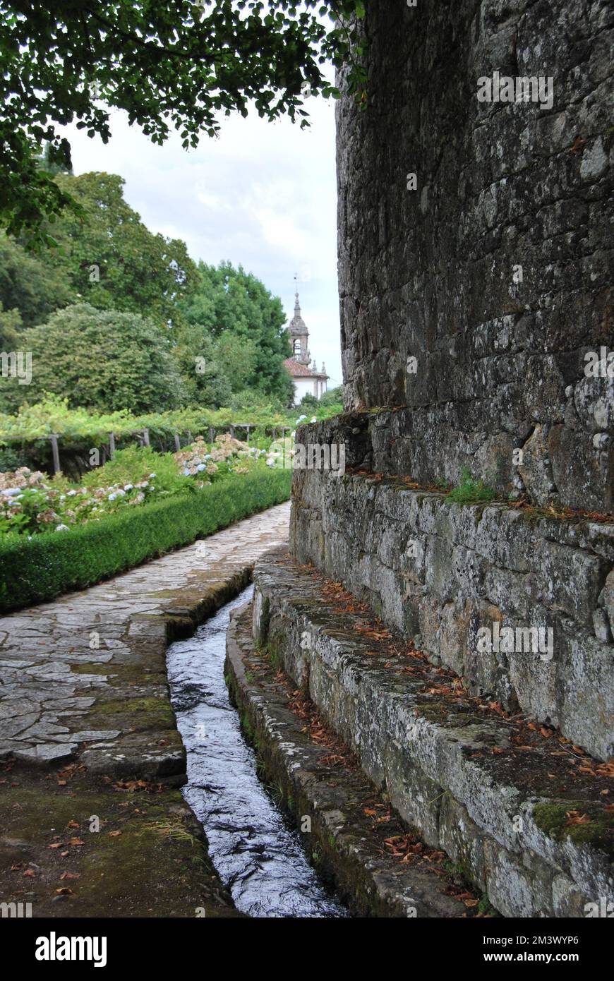 A Beautiful view of green historical garden Pazo de Oca with plants and ...