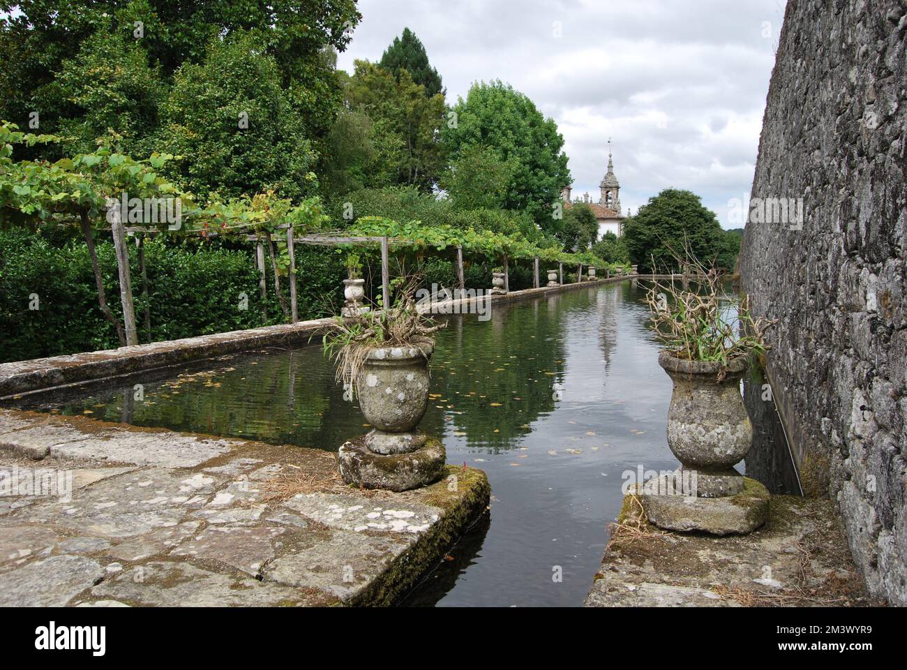 A Beautiful view of green historical garden Pazo de Oca with plants and ...